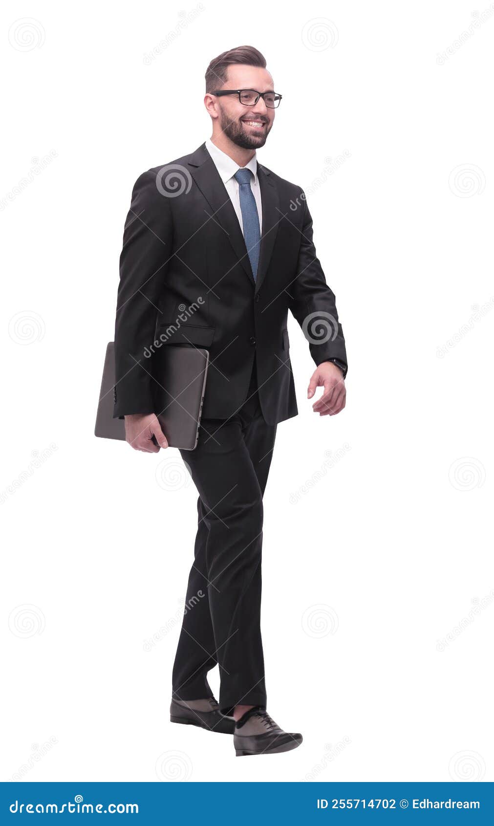 Side View. Smiling Businessman with Laptop Stepping Forward Stock Photo ...