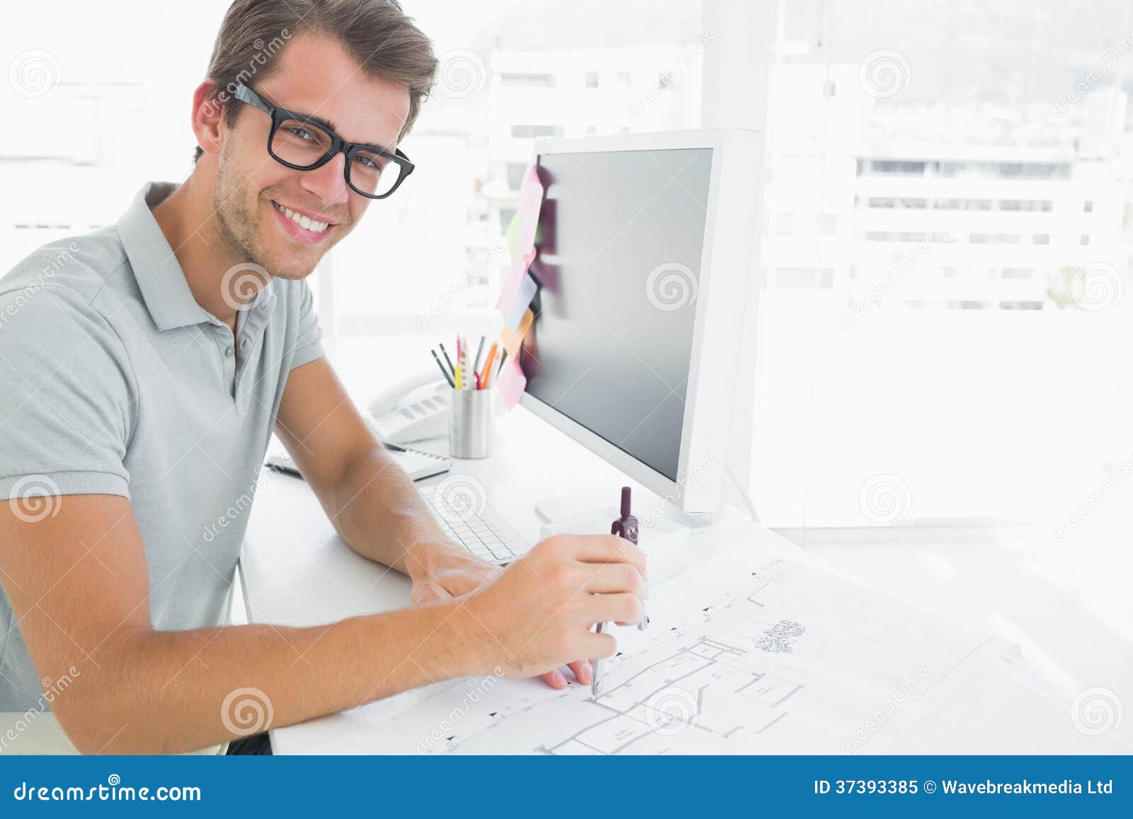 Side View of a Smiling Young Man Using Compass Stock Image - Image of ...