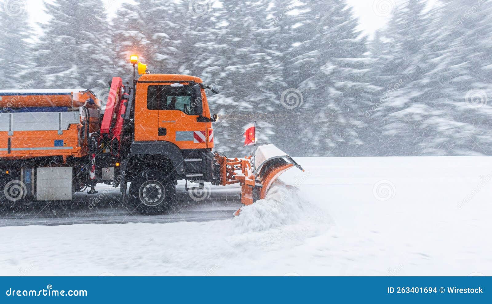 Side View of a Snowplow at Work in the Grosser Feldberg in Germany with ...