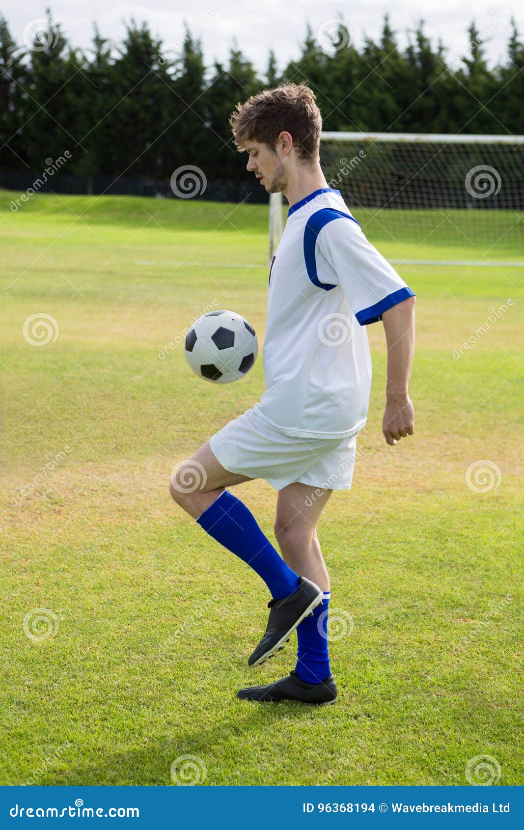 Side View of Soccer Player Playing with Ball Stock Photo - Image of ...
