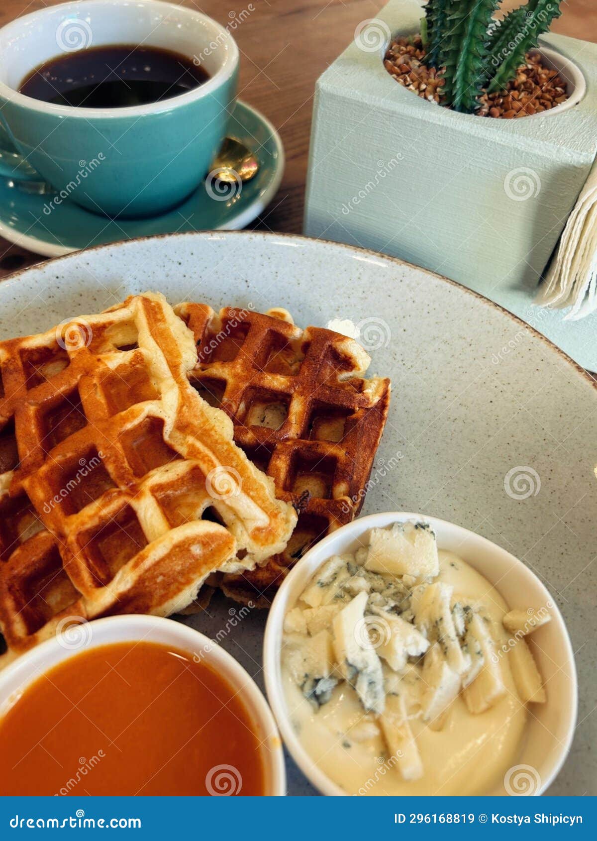 Side View of Soft Waffles with Sauces in a Gray Plate Stock Image ...