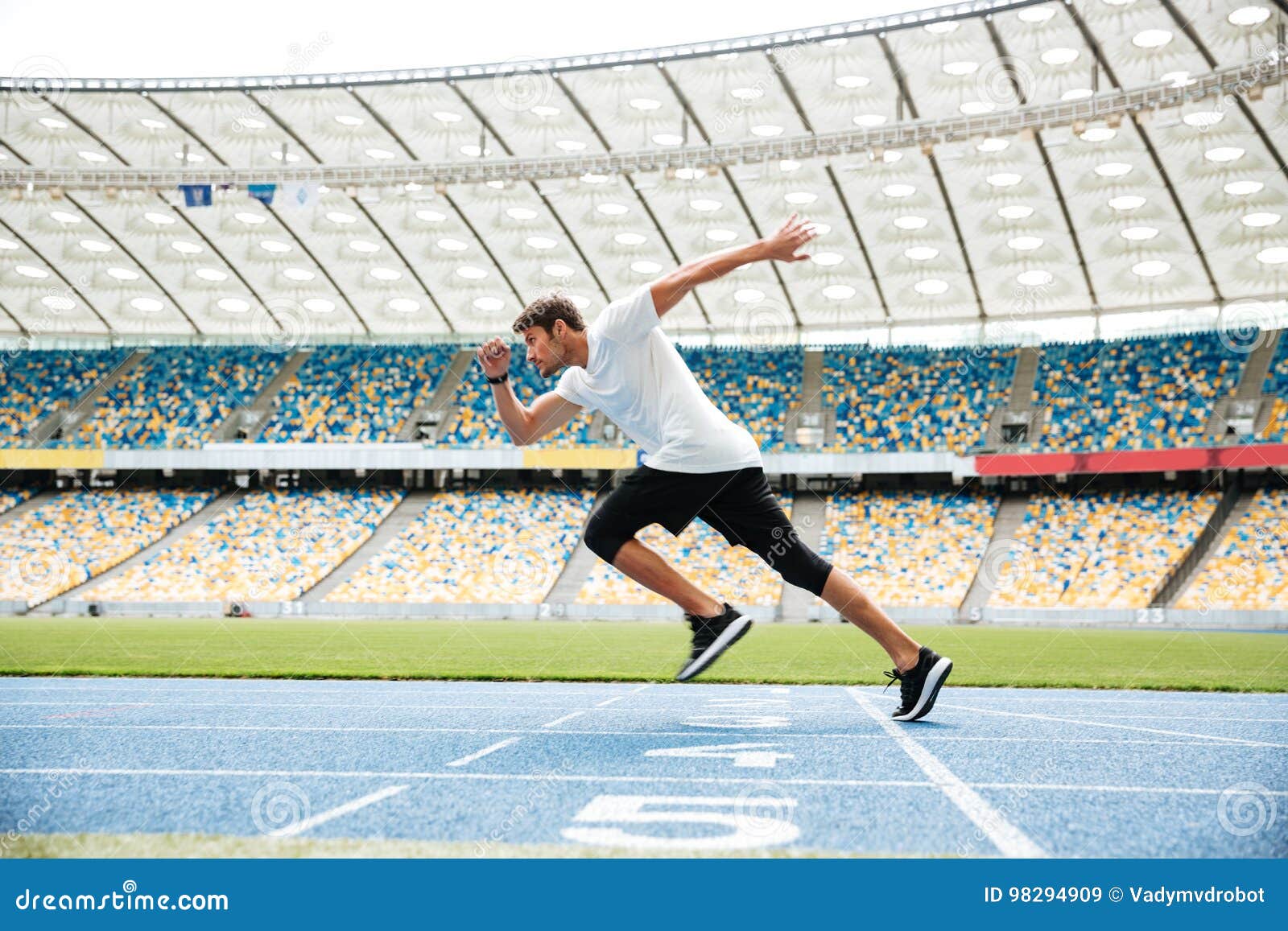 Side View of a Sport Man Running on a Racetrack Stock Image - Image of ...