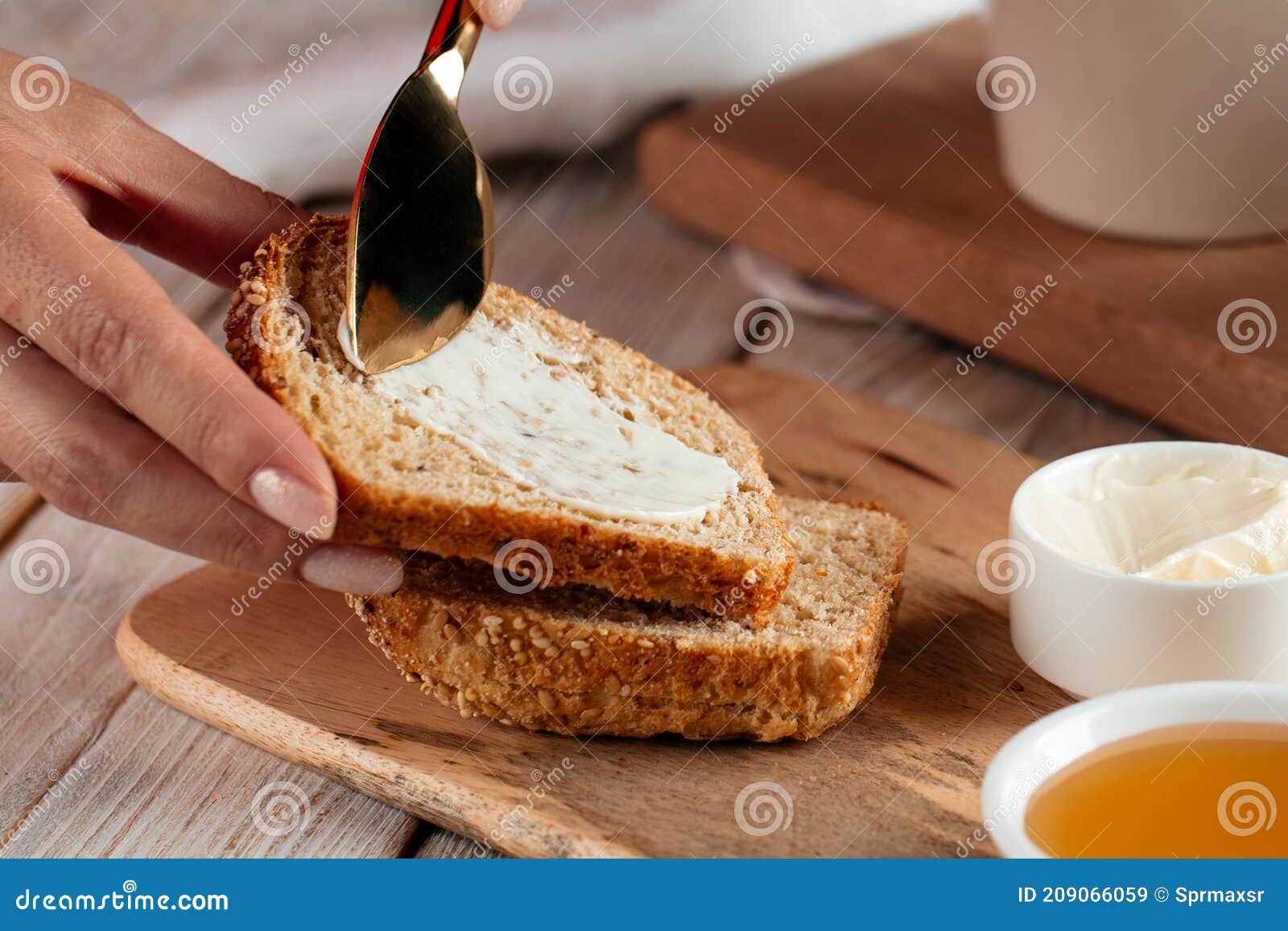 Side View on Spreading Bread Slice with Butter Stock Image - Image of ...