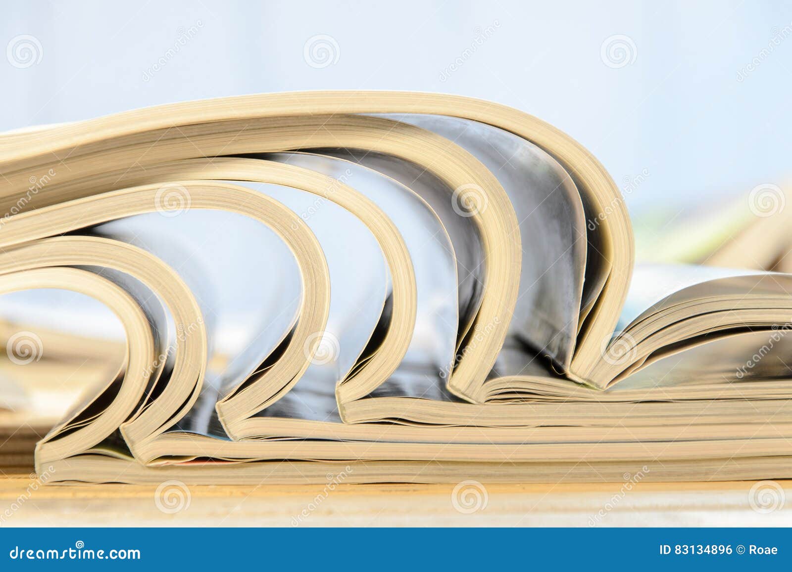 Side View of a Stack of Magazines Stock Photo - Image of colorful, heap ...