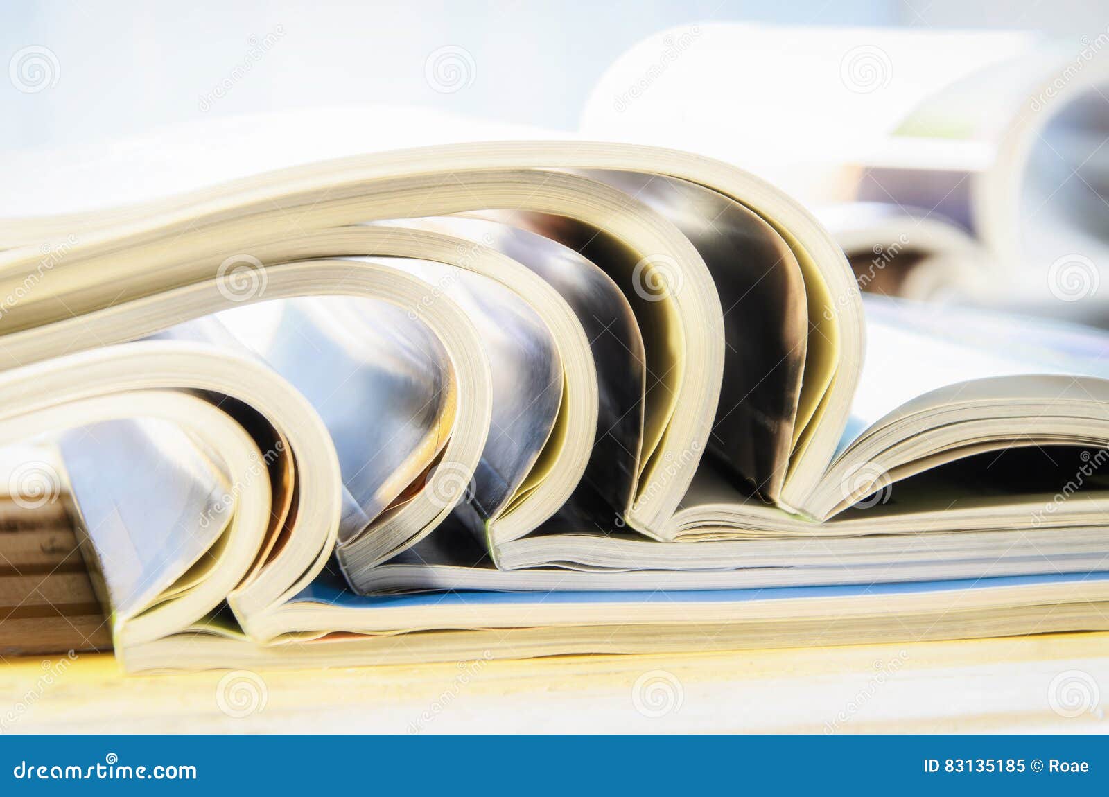 Side View of a Stack of Magazines Stock Image - Image of media ...