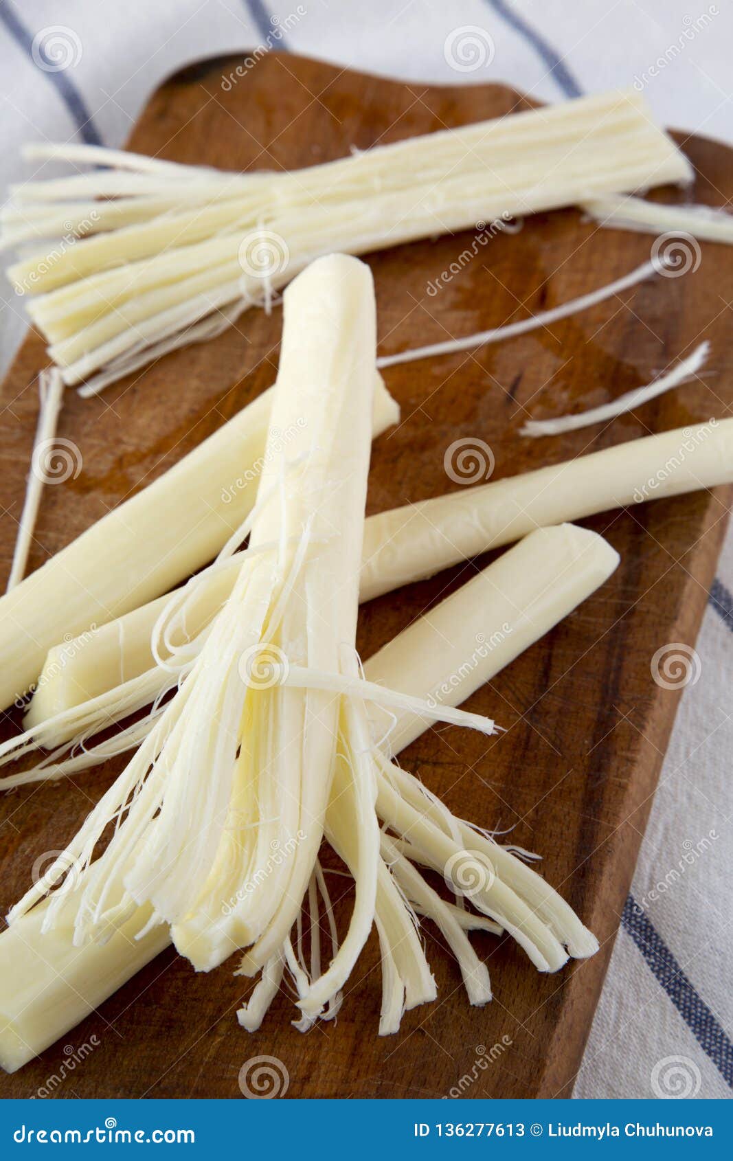 Side View, String Cheese on Rustic Wooden Board. Healthy Snack Stock ...
