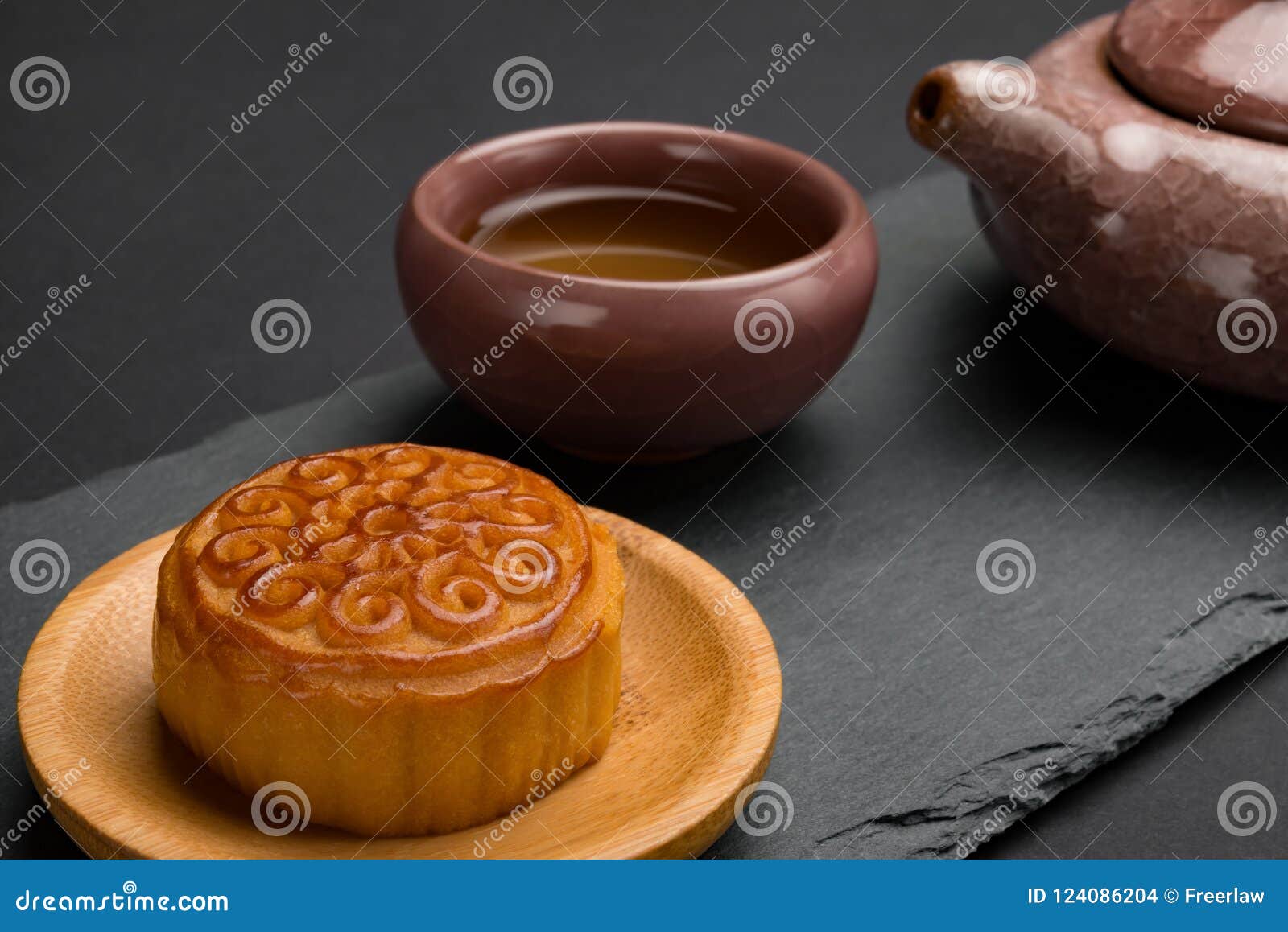 Side View Studio Shoot of Traditional Chinese Mooncake with Tea and ...