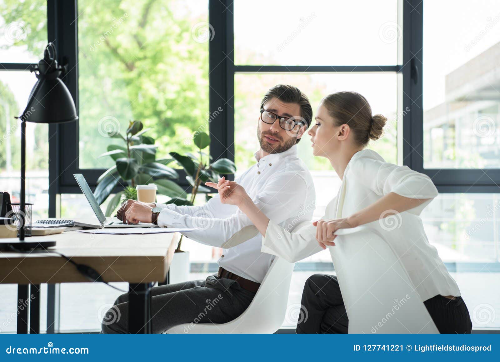 Side View of Successful Young Managers Working Together Stock Image ...