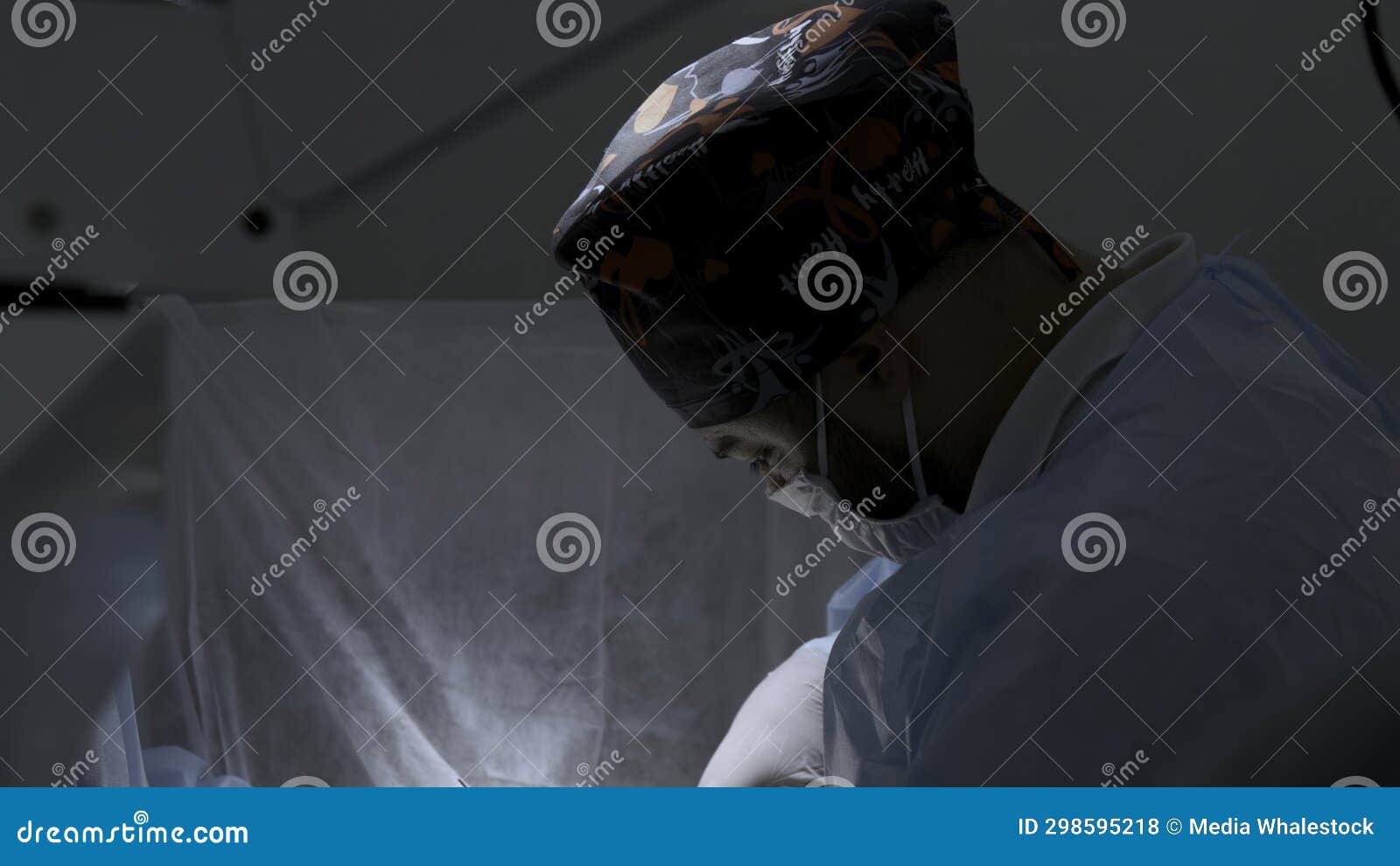 Side View of a Surgeon at Work in Operating Room. Action. Medical ...