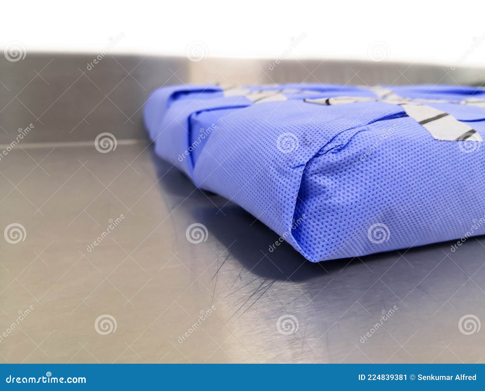 Side View of Surgical Instruments Set Wrapped with Disposable Blue ...