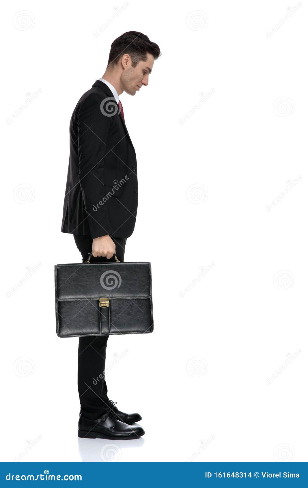 Side View of Thoughtful Businessman Looking Down Stock Photo - Image of ...