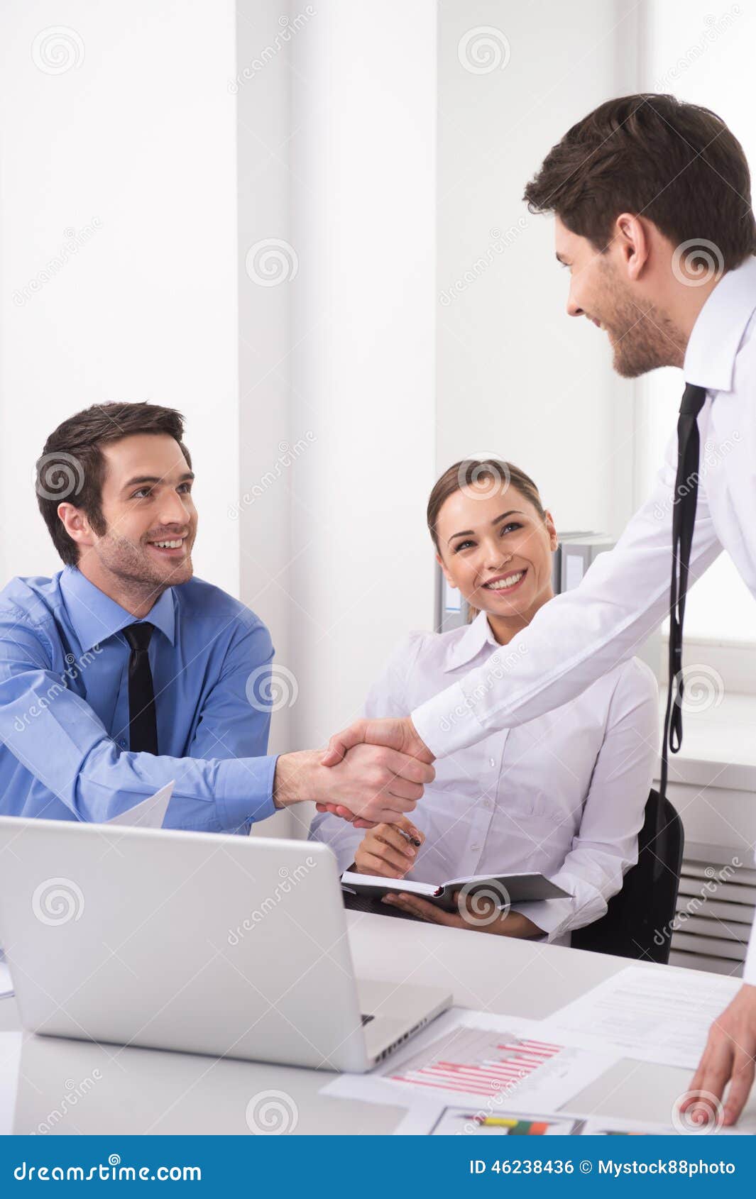Side View of Three People Working on Computer at Office. Stock Photo ...
