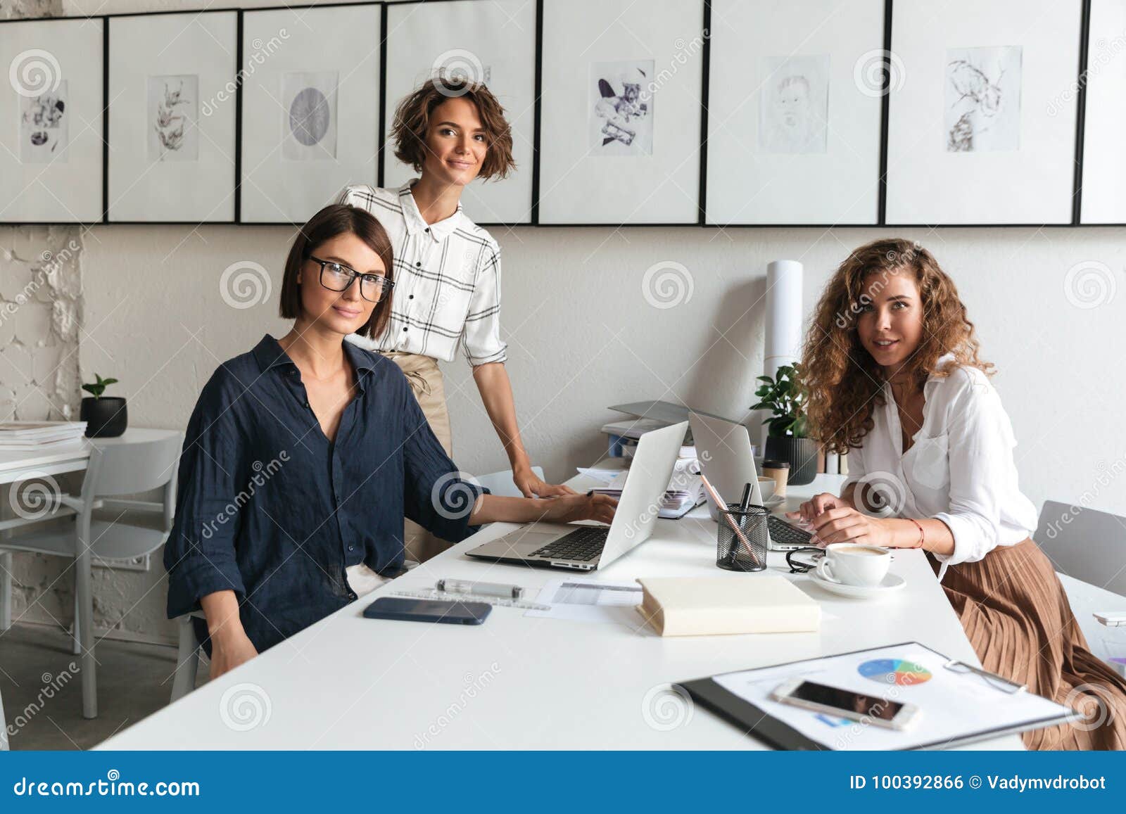 Side View of Three Women are Discussing Something Stock Photo - Image ...