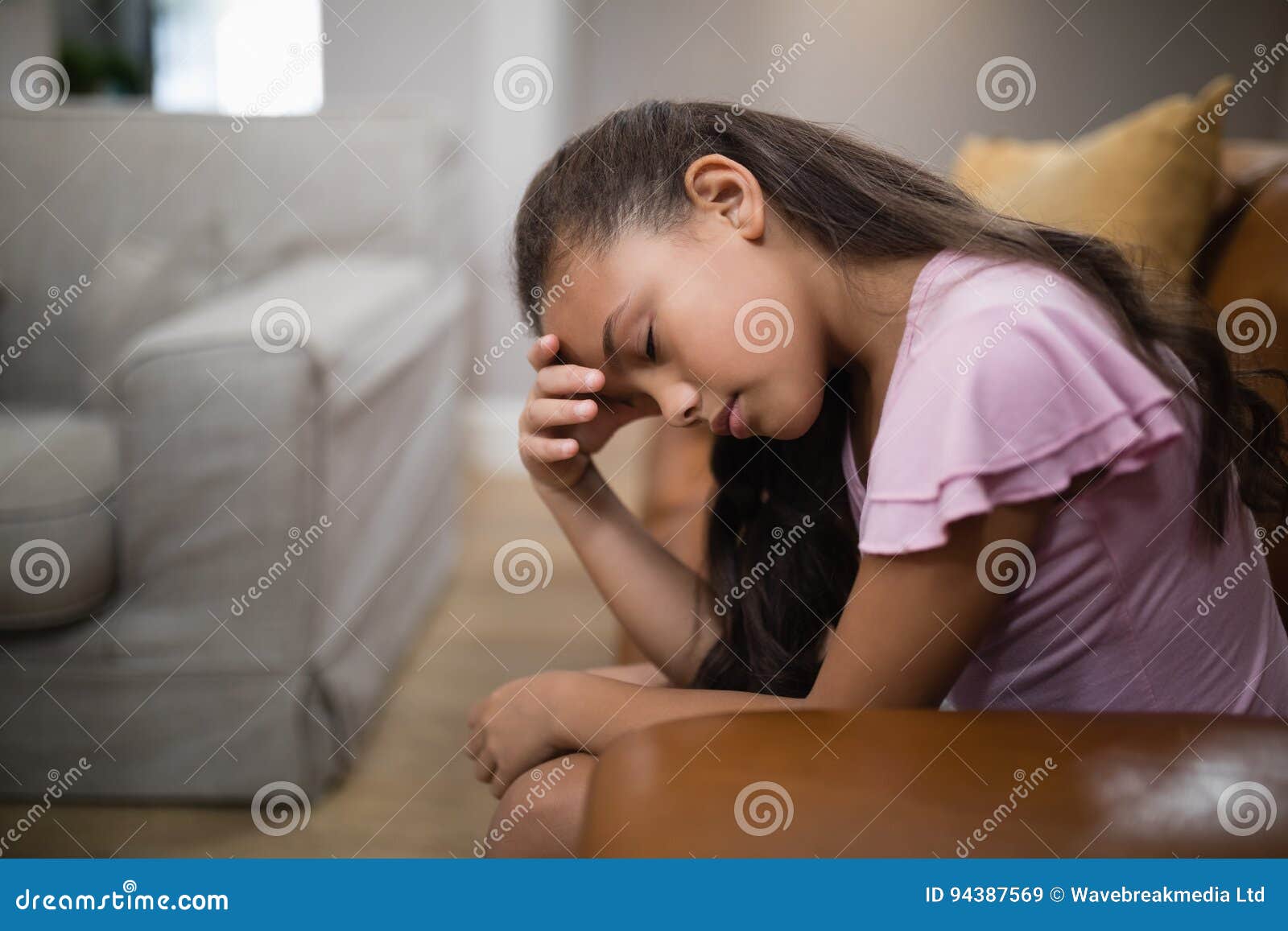 Side View of Tired Girl Sitting on Sofa Stock Image - Image of couch ...