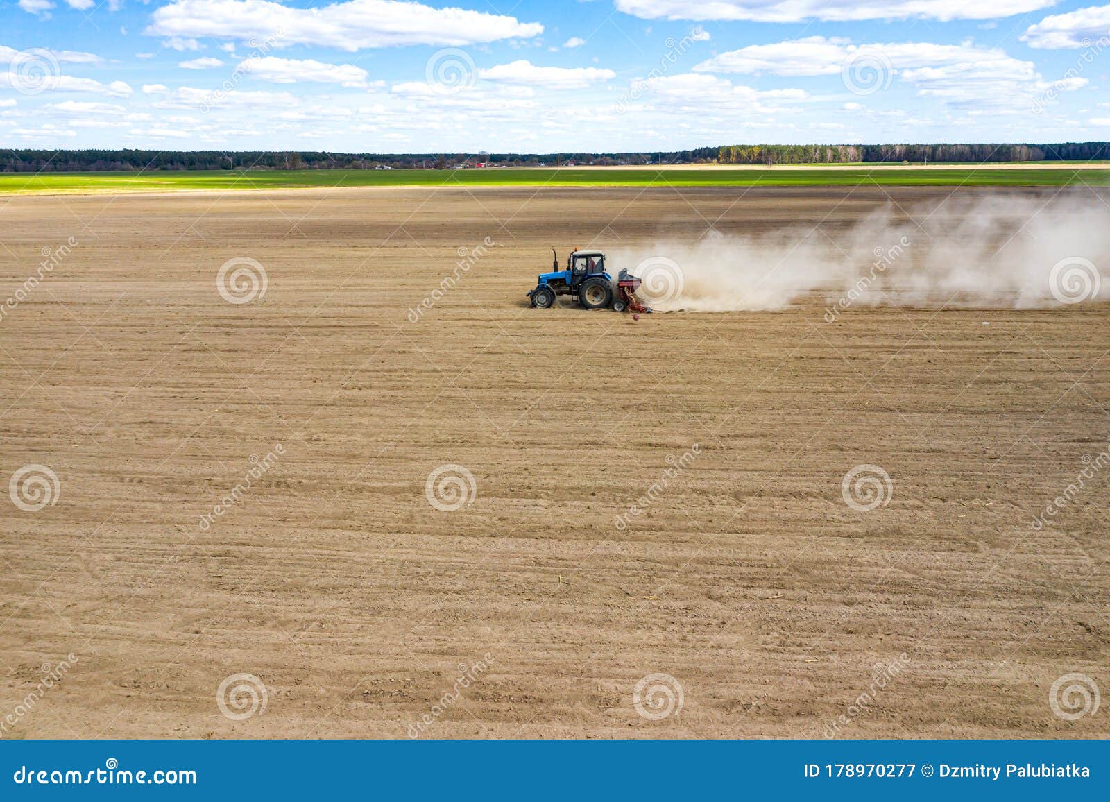 Side View of Tractor Planting Corn Seed in Field, High Angle View Drone ...