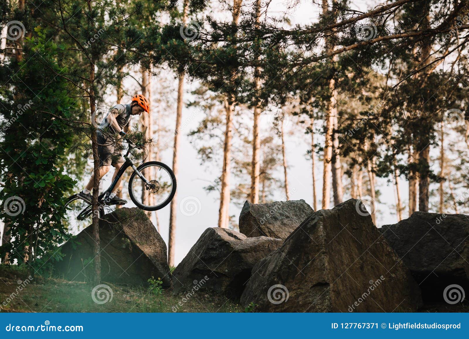 Side View of Trial Biker Balancing on Rocks Outdoors Stock Image ...