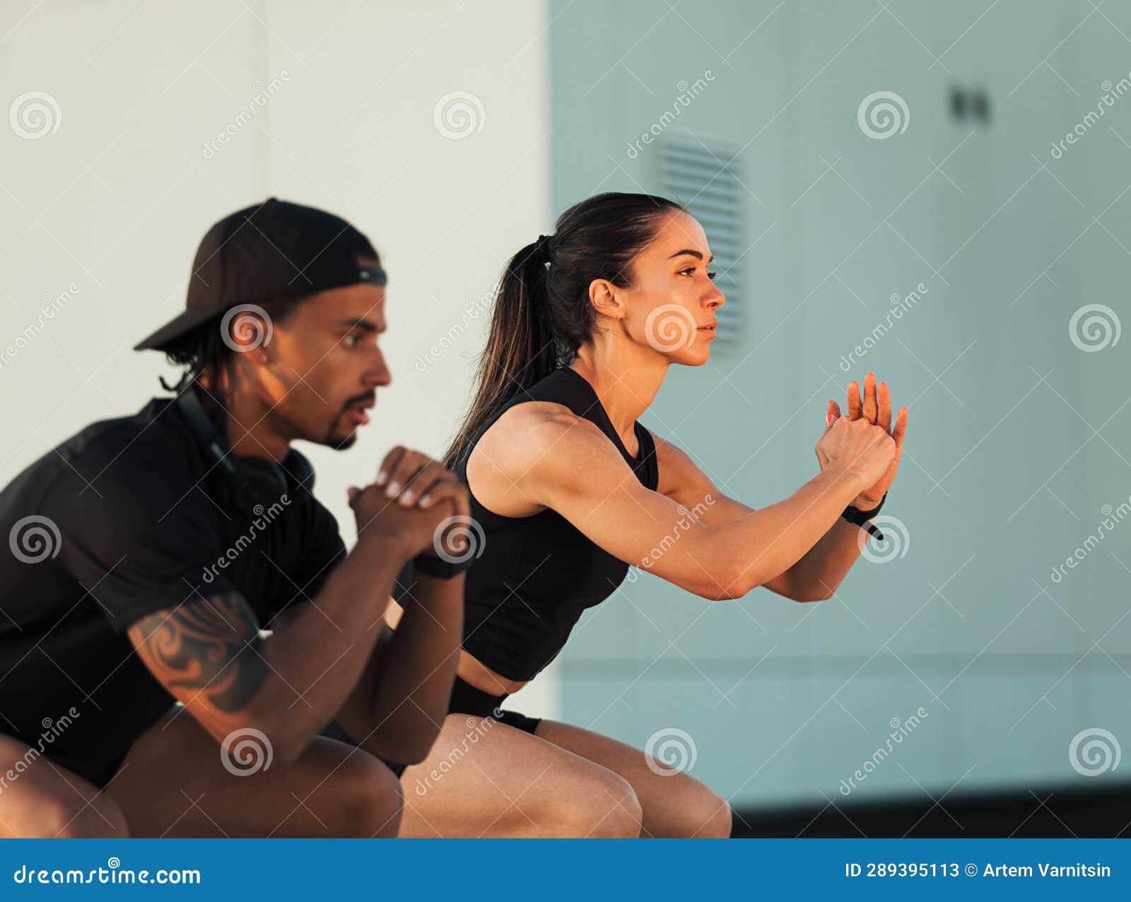 Side View of Two Athletes Doing Squats Stock Image - Image of real ...
