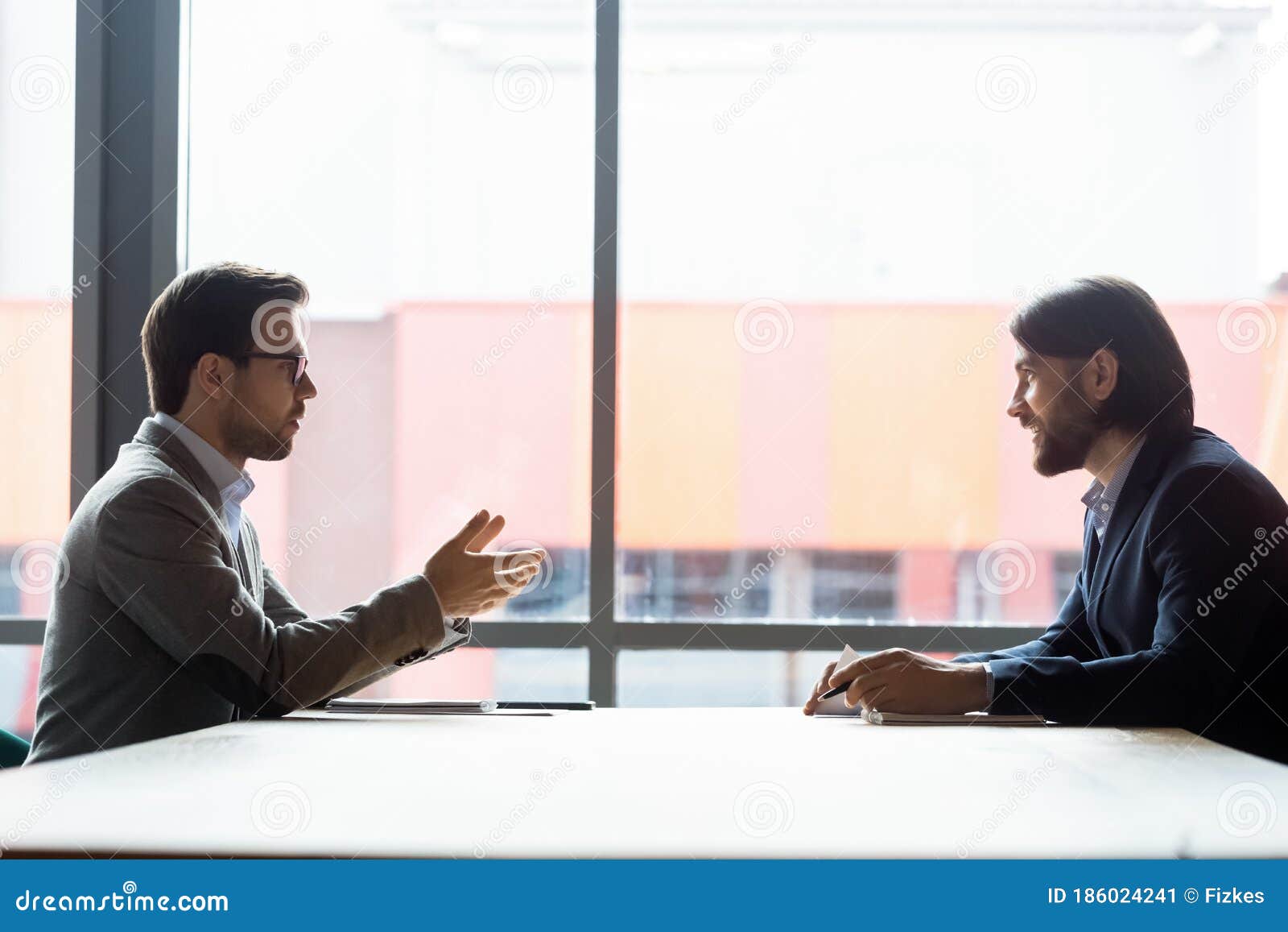 Side View Two Businessmen Solve Current Issues Talking during ...