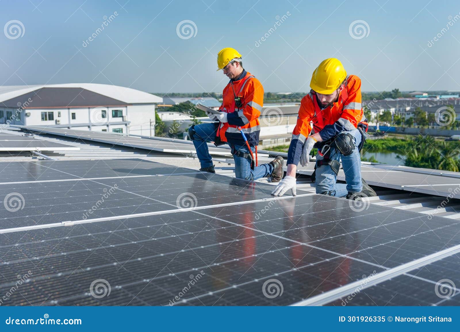 Side View of Two Caucasian Workers Hold Document Pad and Tablet Check ...
