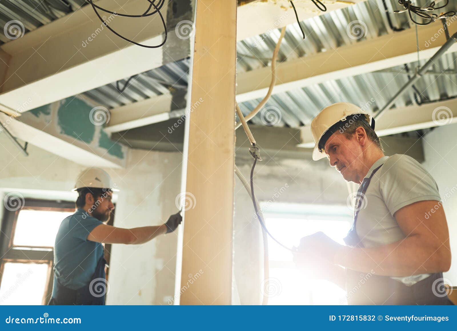 Crew Workers on Site stock photo. Image of remodelling - 172815832