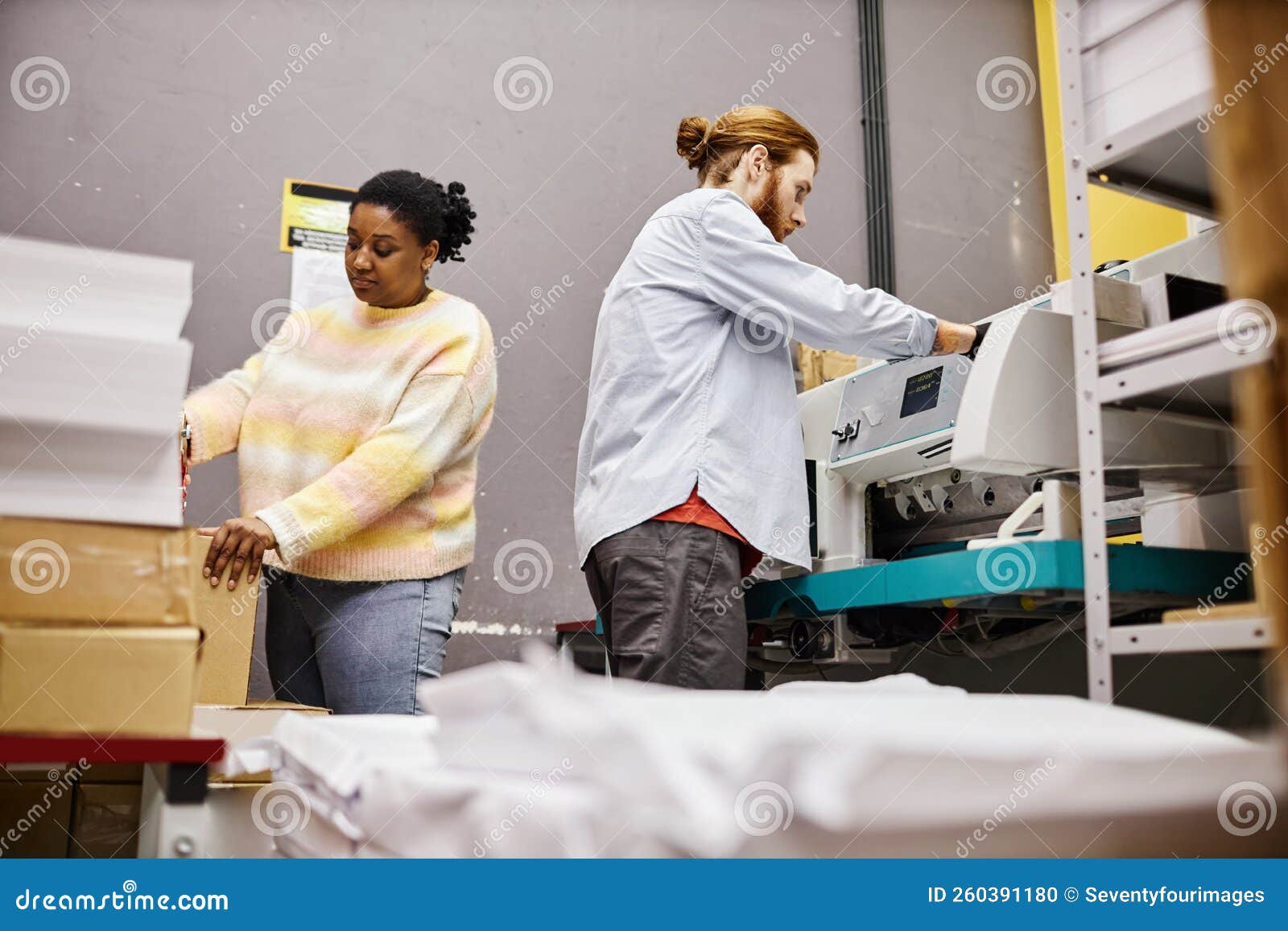 Work Process at Printshop stock photo. Image of young - 260391180