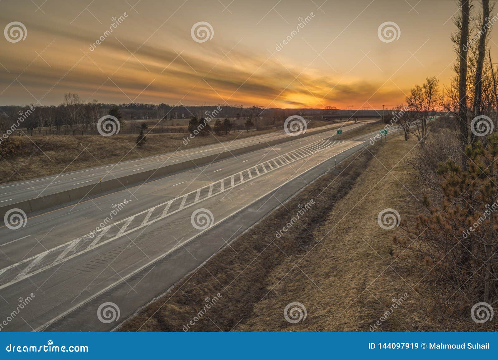 Sunset on a US motorway stock image. Image of angle - 144097919