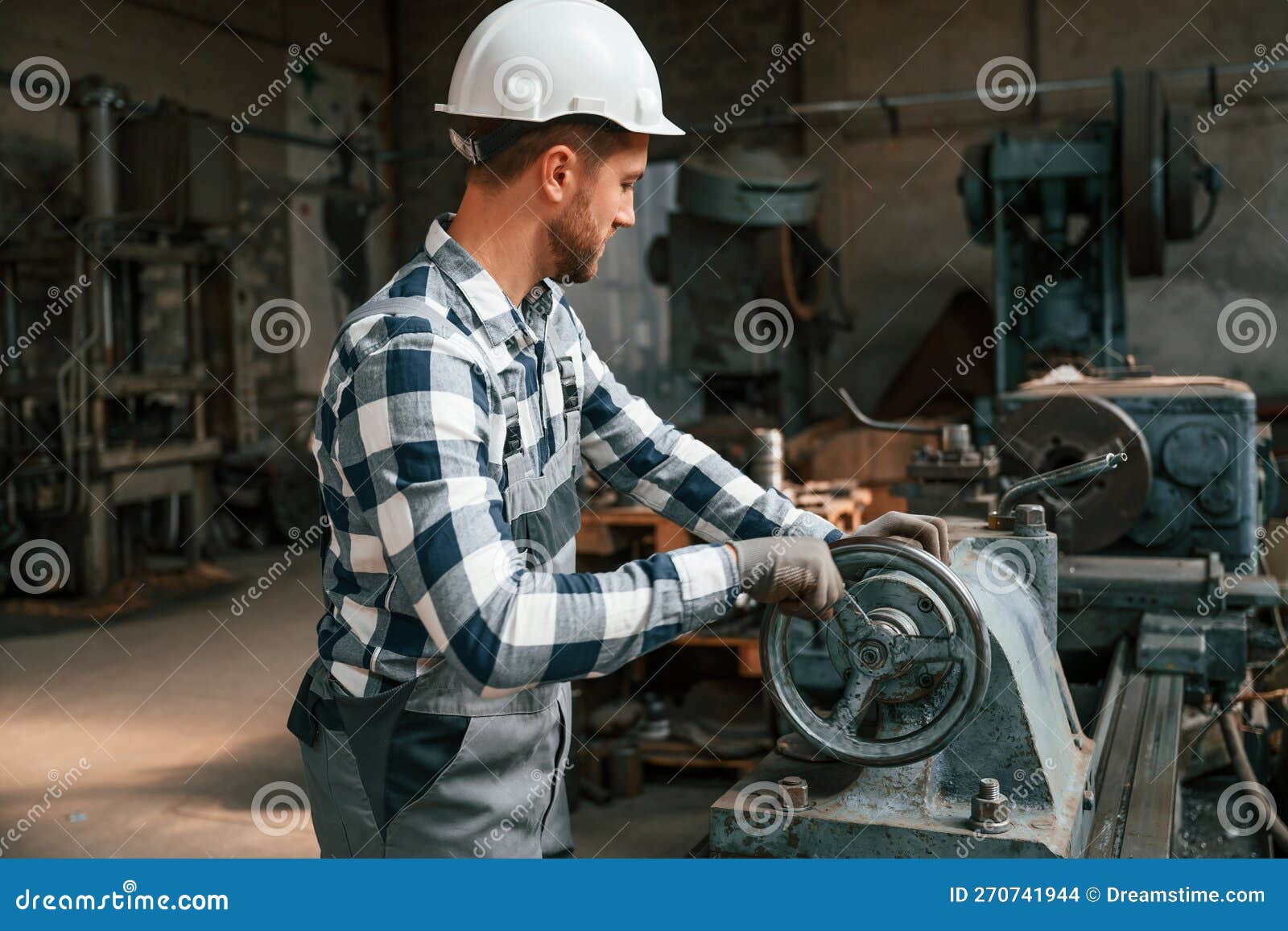 Side view. Using machine stock photo. Image of labor - 270741944