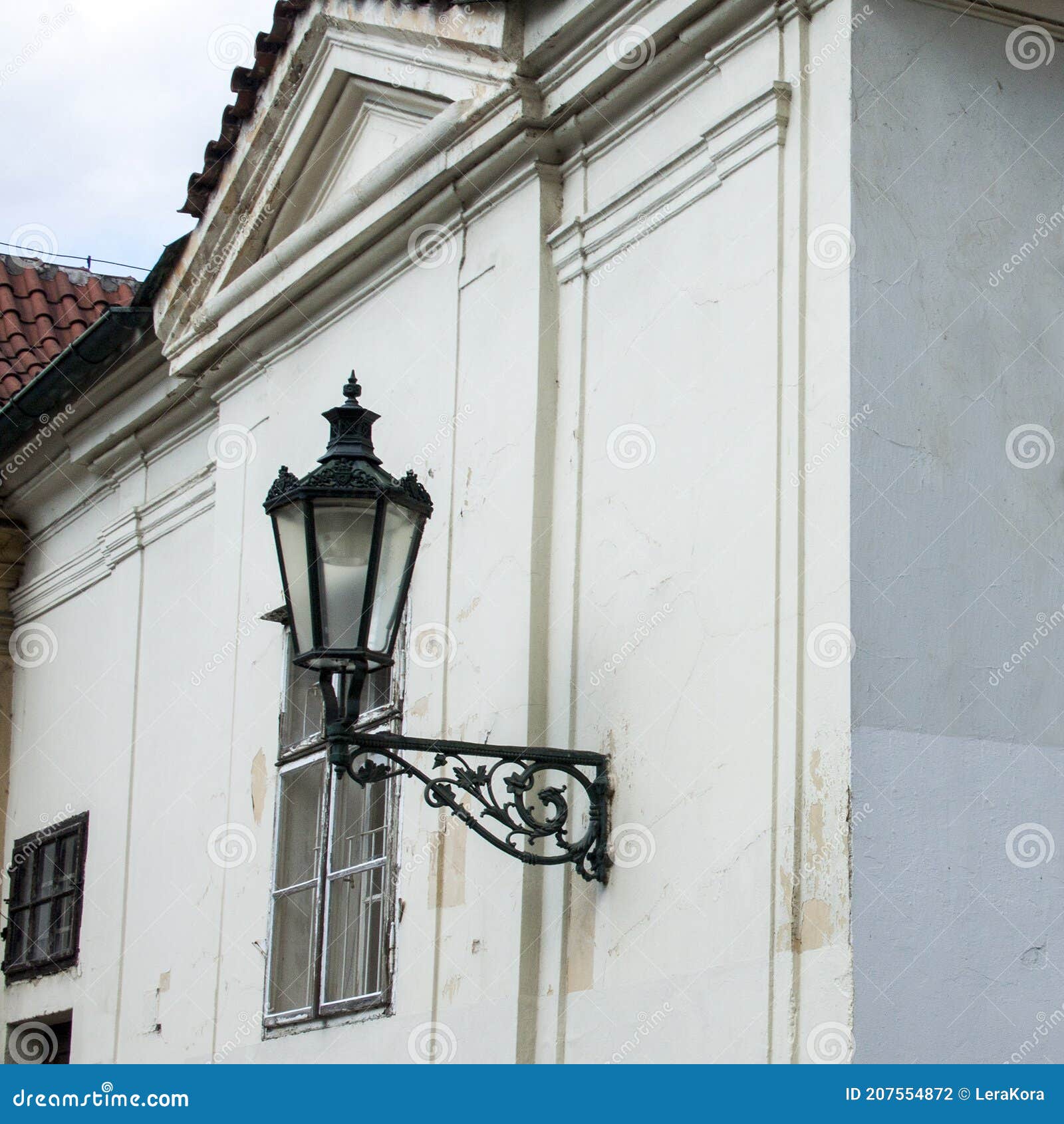 Side View of a Vintage Metal Lantern Mounted on a Building Wall. Stock ...