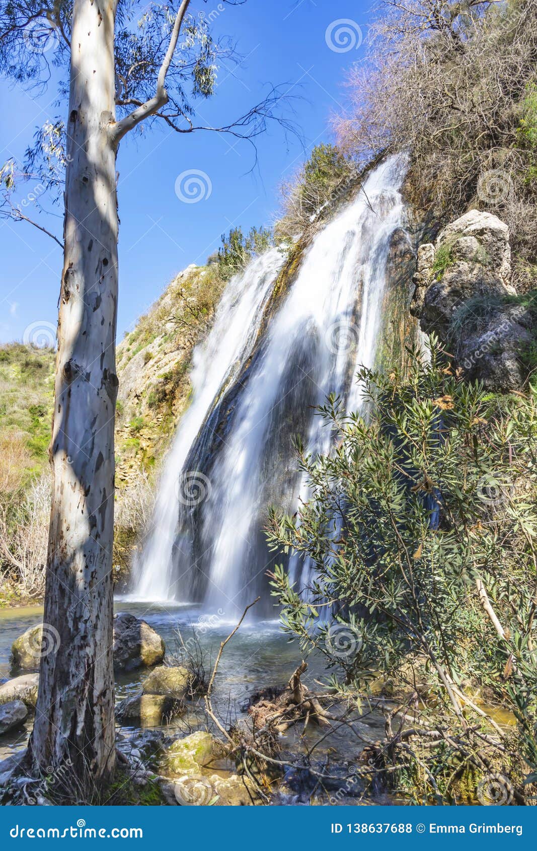 Side View of the Waterfall and the Pond in Front of it among the Autumn ...