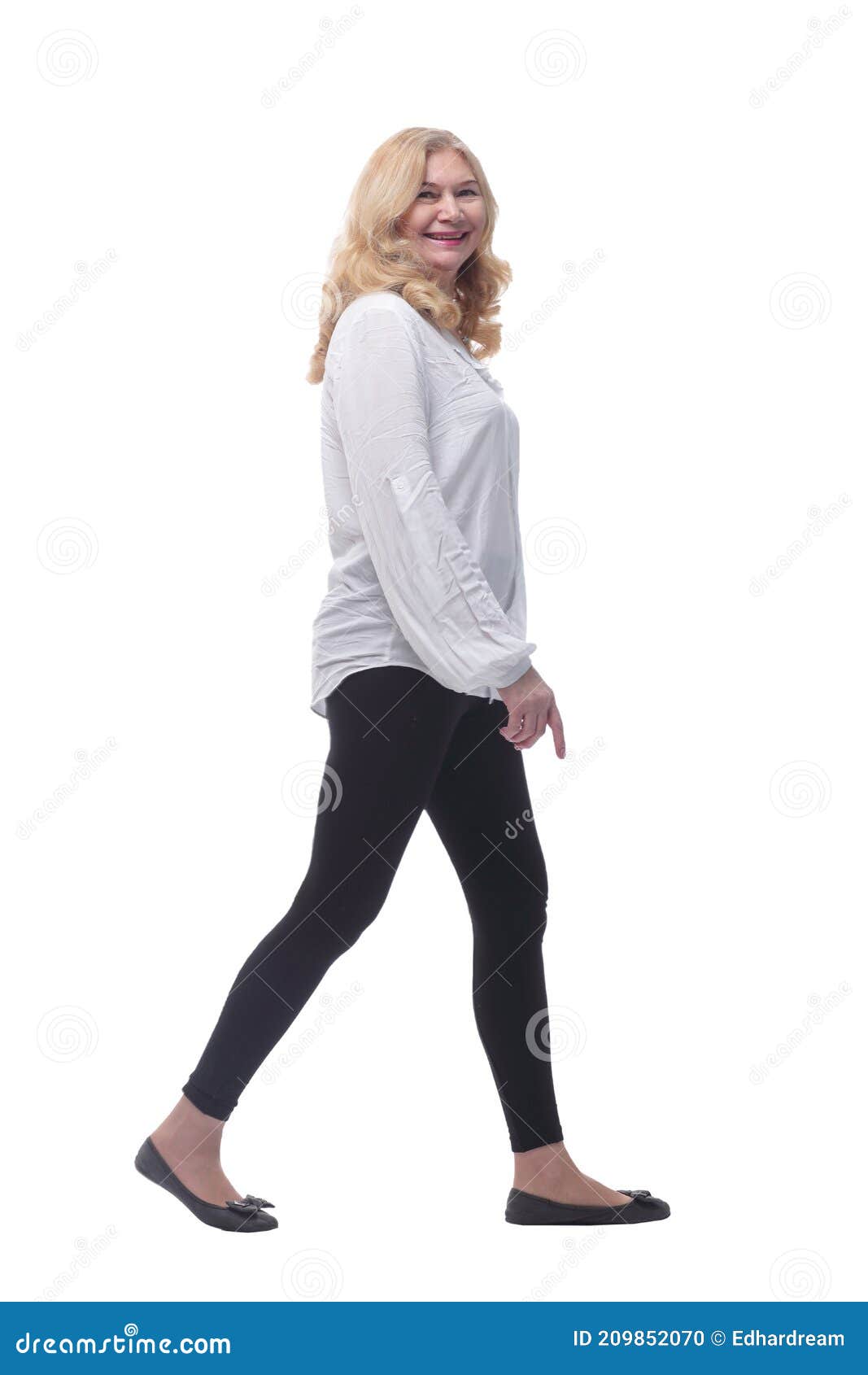 Side View. Woman in Comfortable Clothing Striding Forward Stock Photo ...
