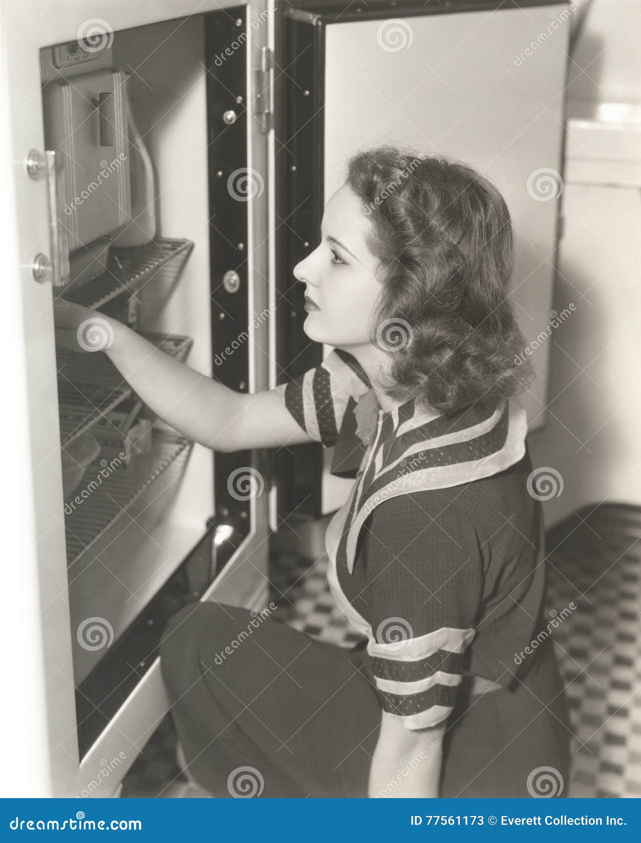 Side View of Woman Looking through Refrigerator Stock Image - Image of ...