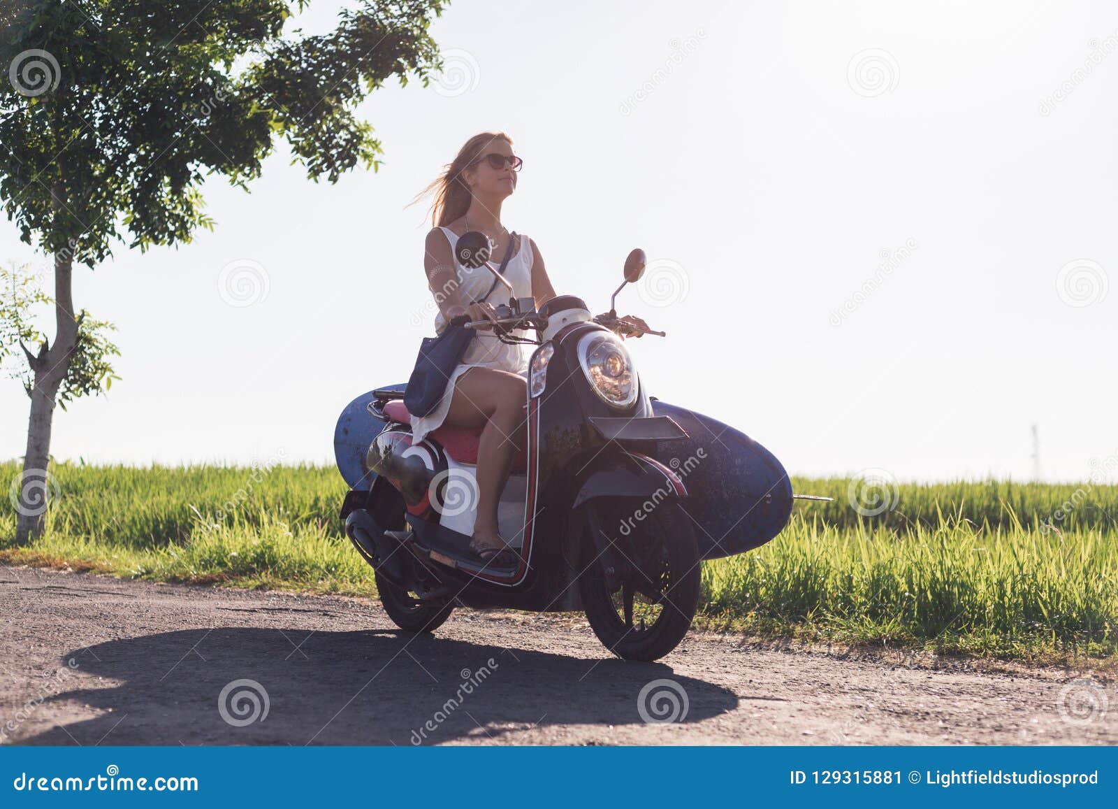 Side View of Woman Riding Scooter Stock Image - Image of scooter ...