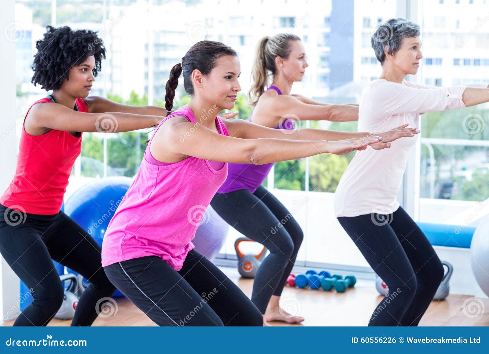 Side View of Women Exercising Stock Photo - Image of black, caucasian ...