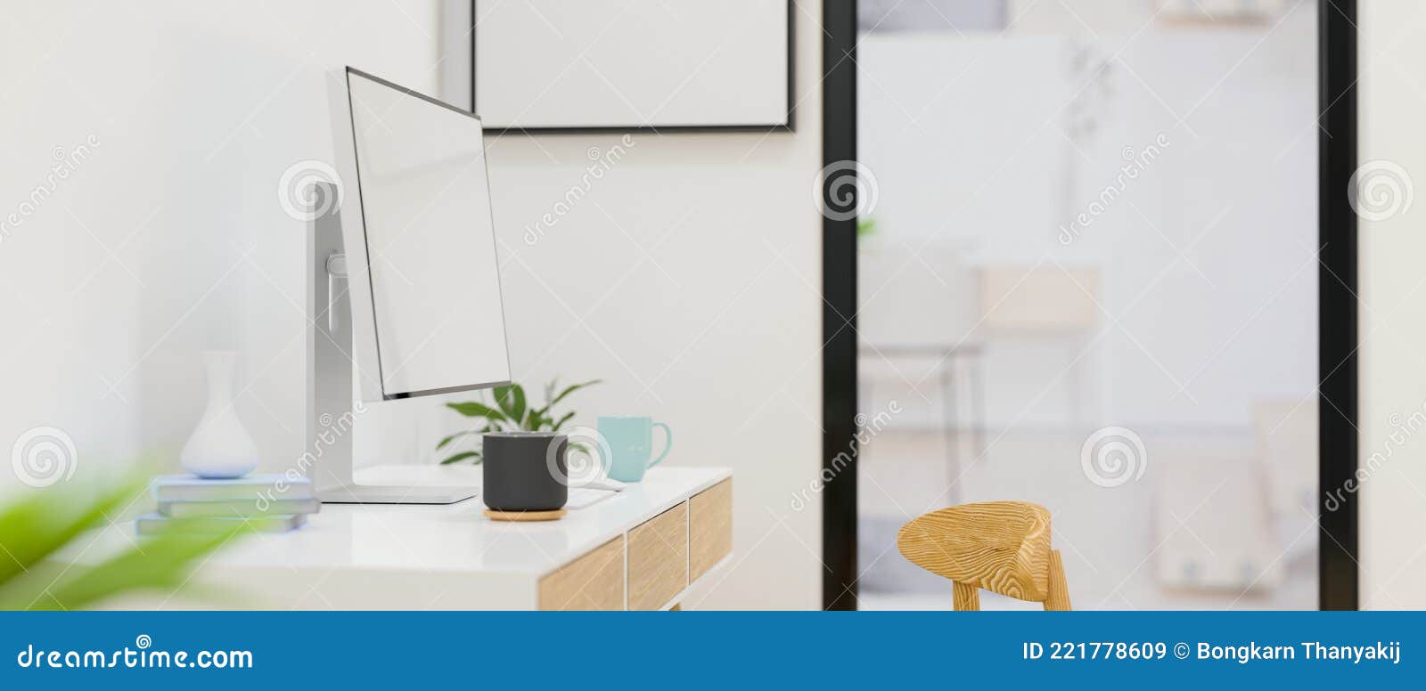 Side View of Working Space with Computer, Supplies and Decorations in ...