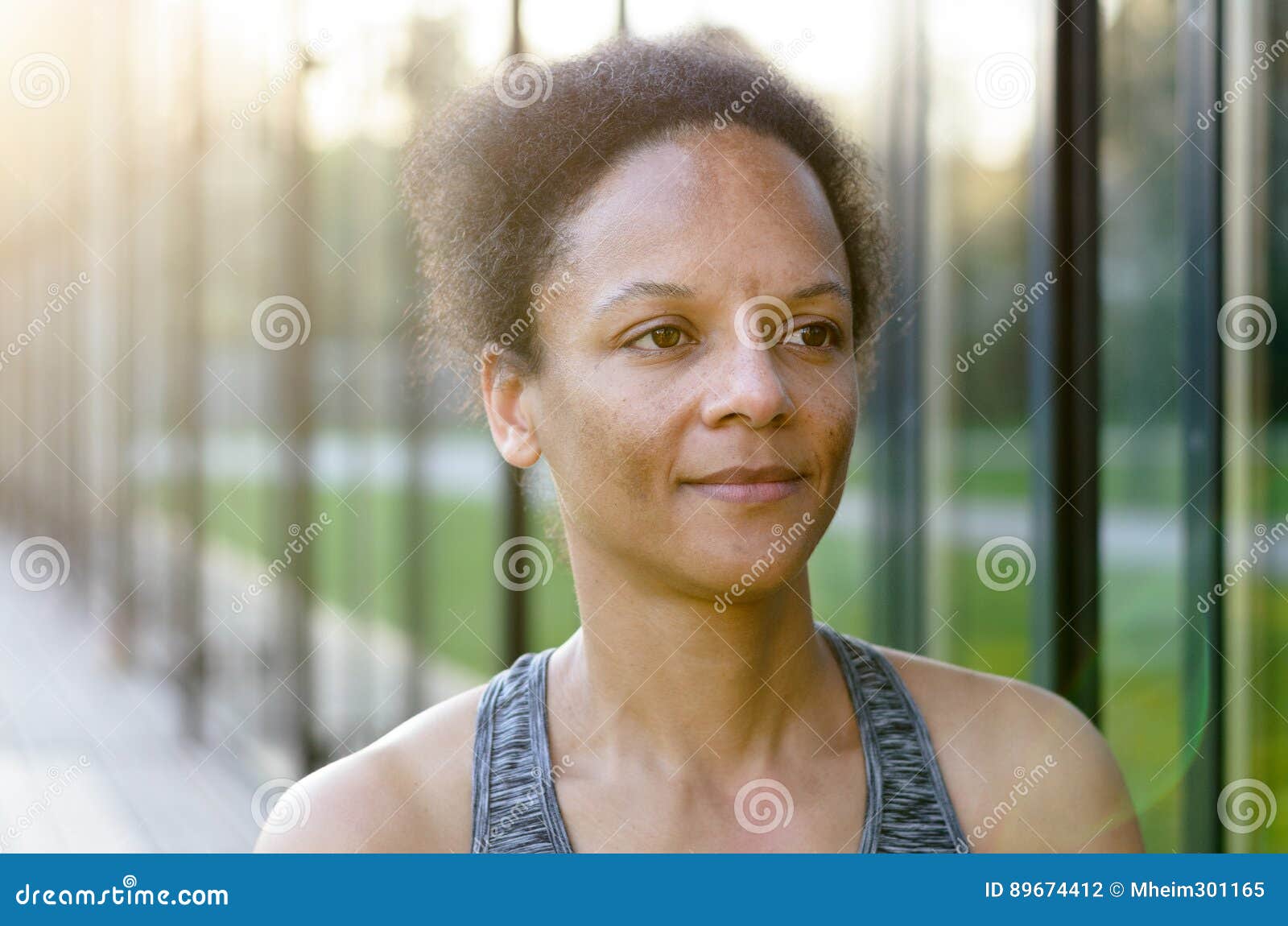 Side View of a Young African Woman Stock Photo - Image of park, adult ...