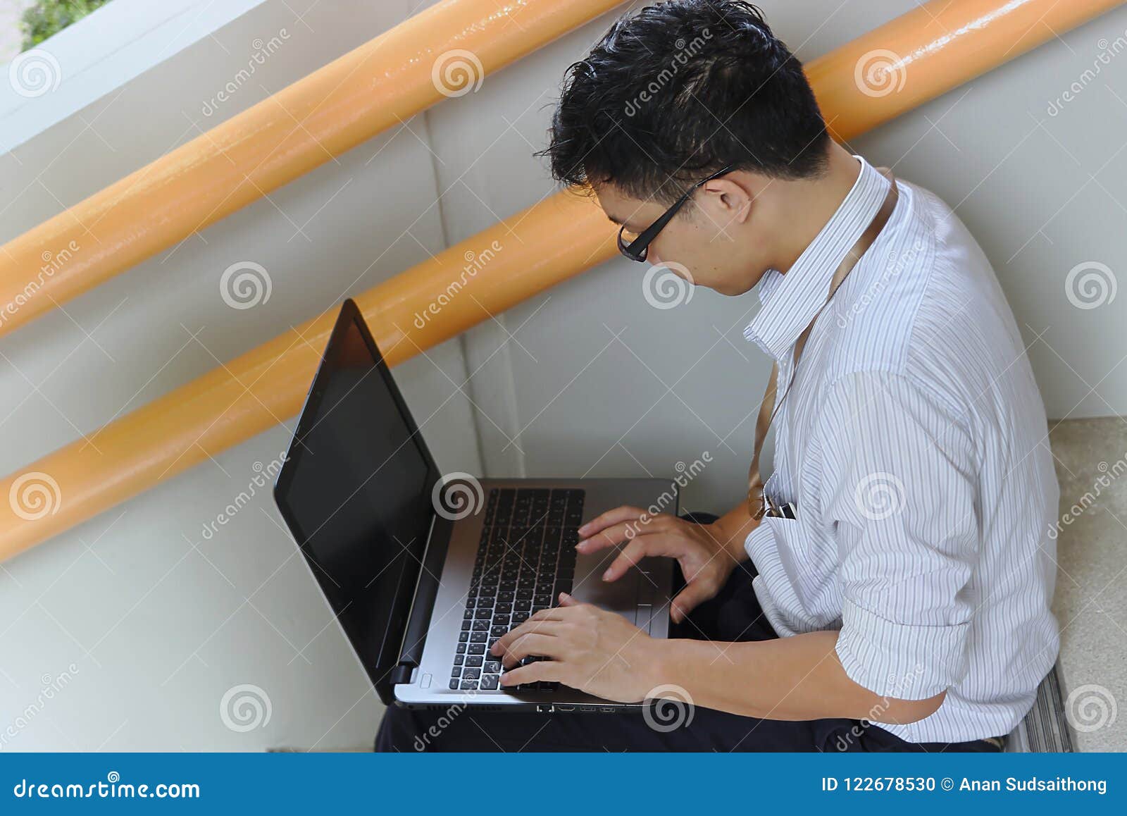 Side View of Young Asian Business Man Using Computer Laptop Stock Photo ...