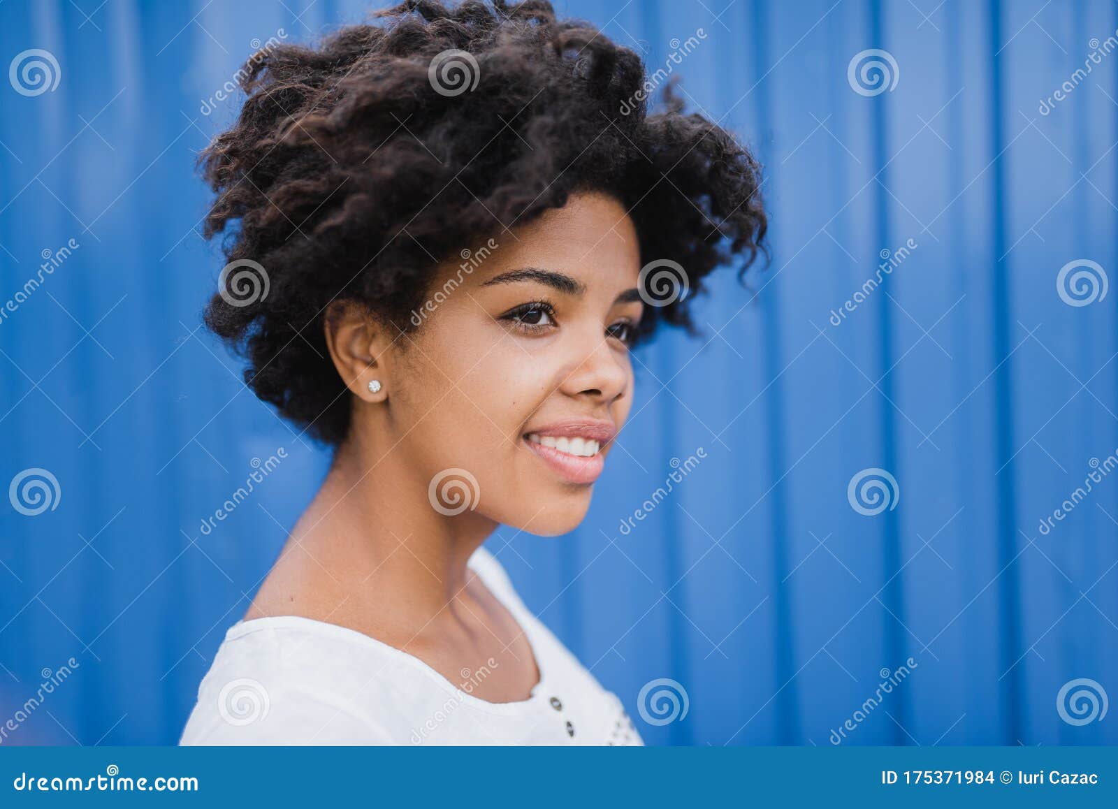 Side View Of Young Beautiful Dark Skinned African American Female With