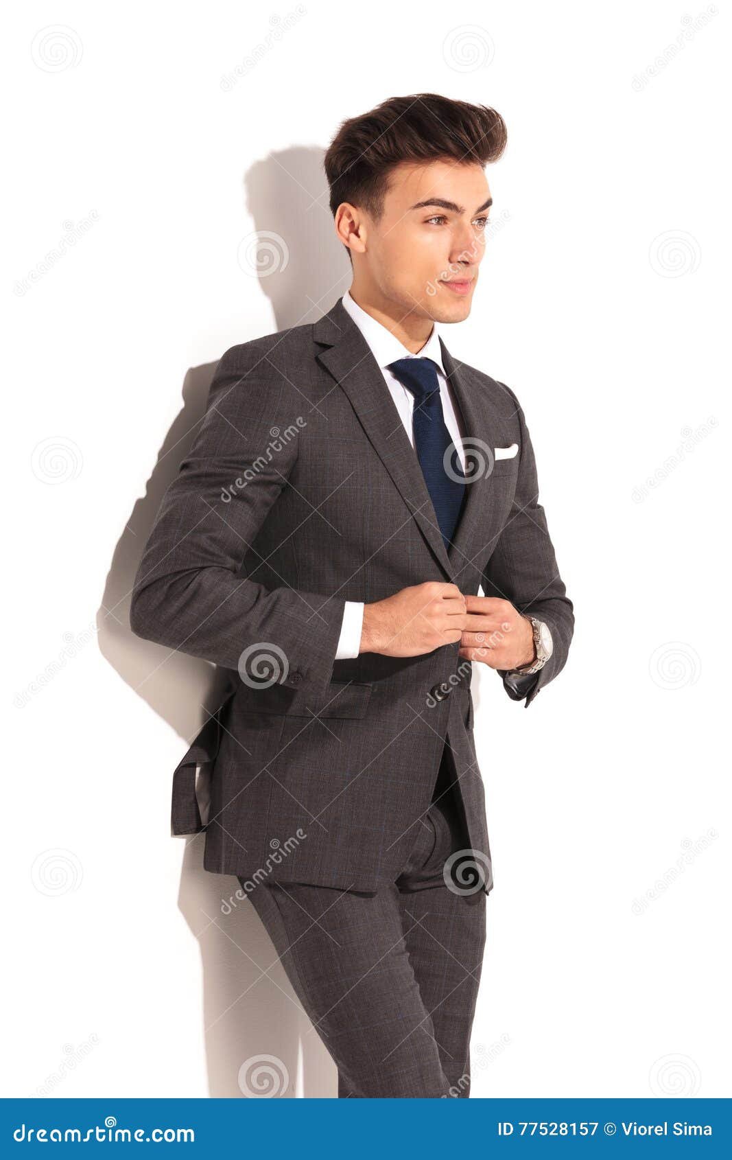 Side View of a Young Business Man Buttoning His Suit Stock Image ...