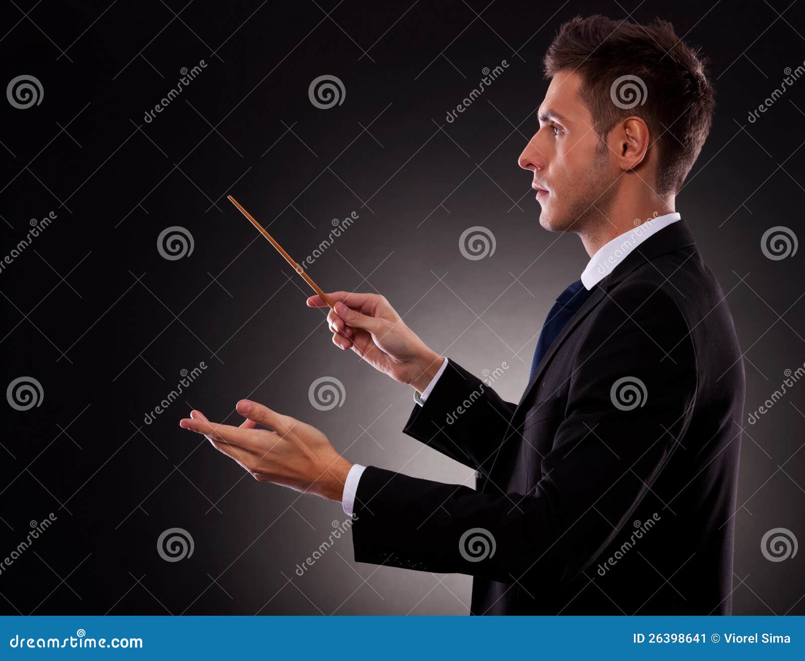 Side View of a Young Business Man Directing Stock Image - Image of ...