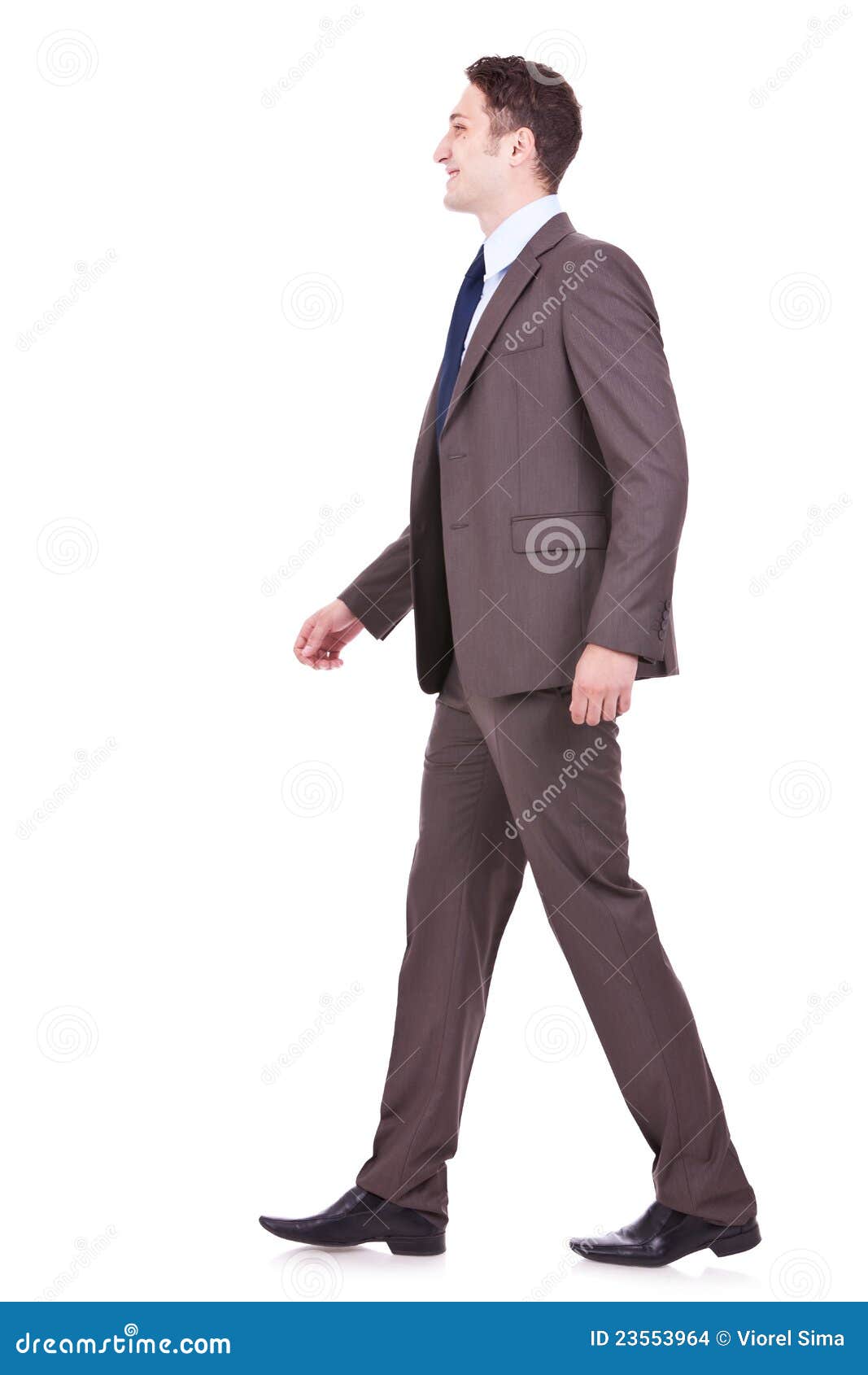Side View of a Young Businessman Walking Stock Photo - Image of copy ...