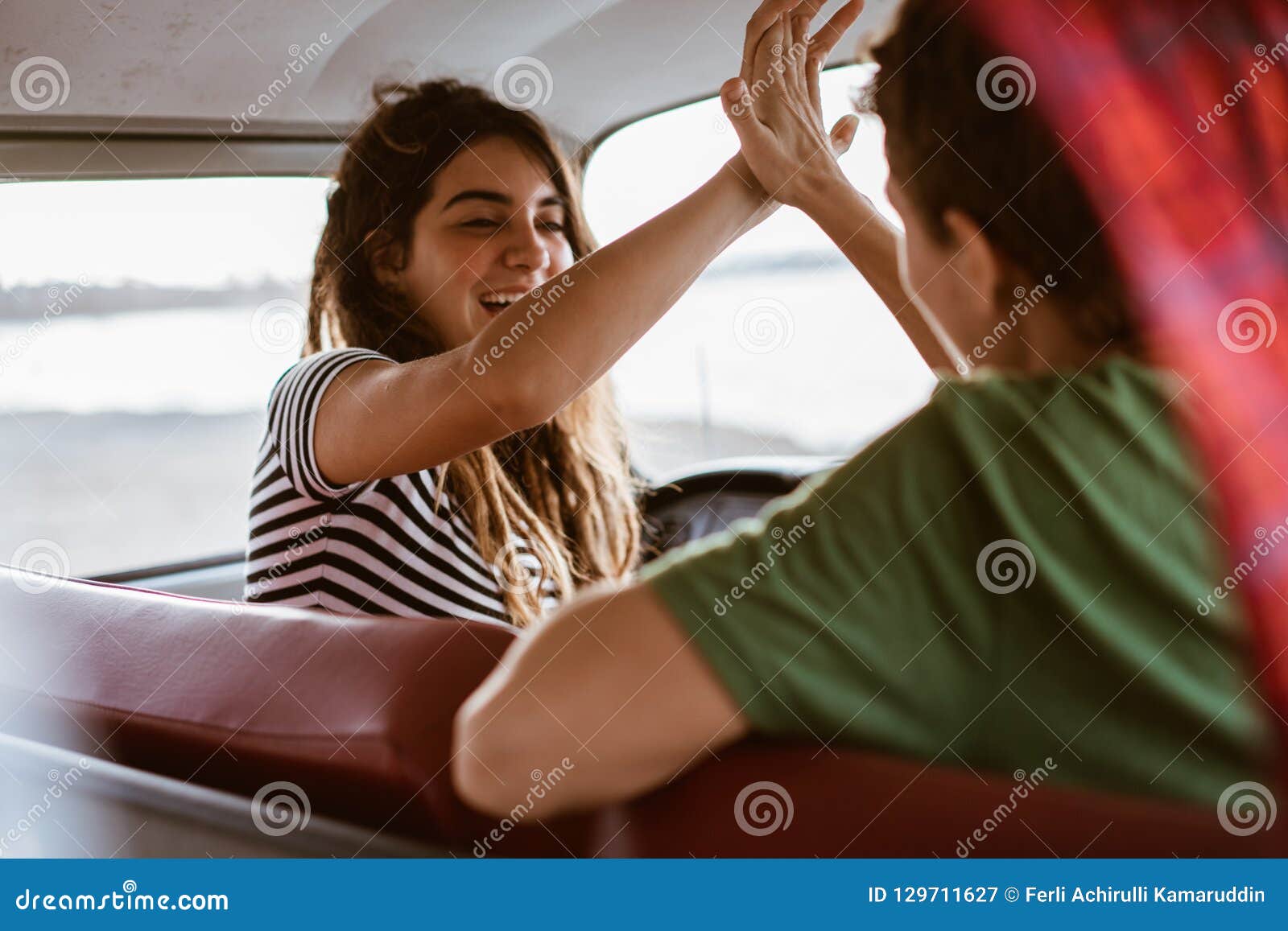 Side View Young Couple High Five Inside Car Stock Image - Image of ...