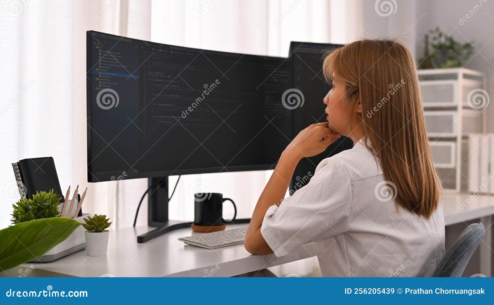 Side View of Young Developer Looking at Coded Data on Computer Screen. Developing Programming ...