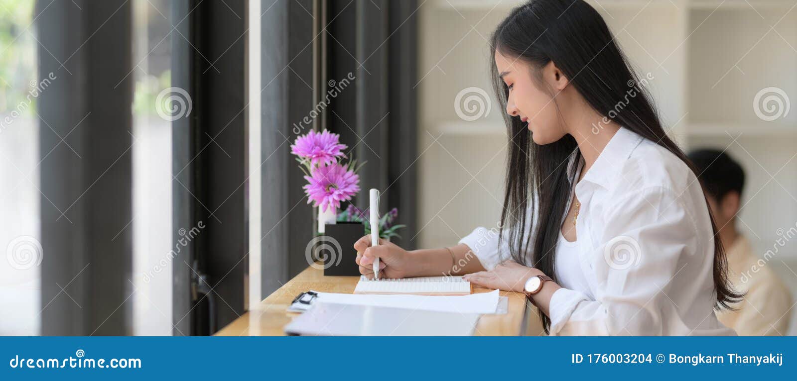 Side View of Young Female College Student Take Short Note while Reading ...