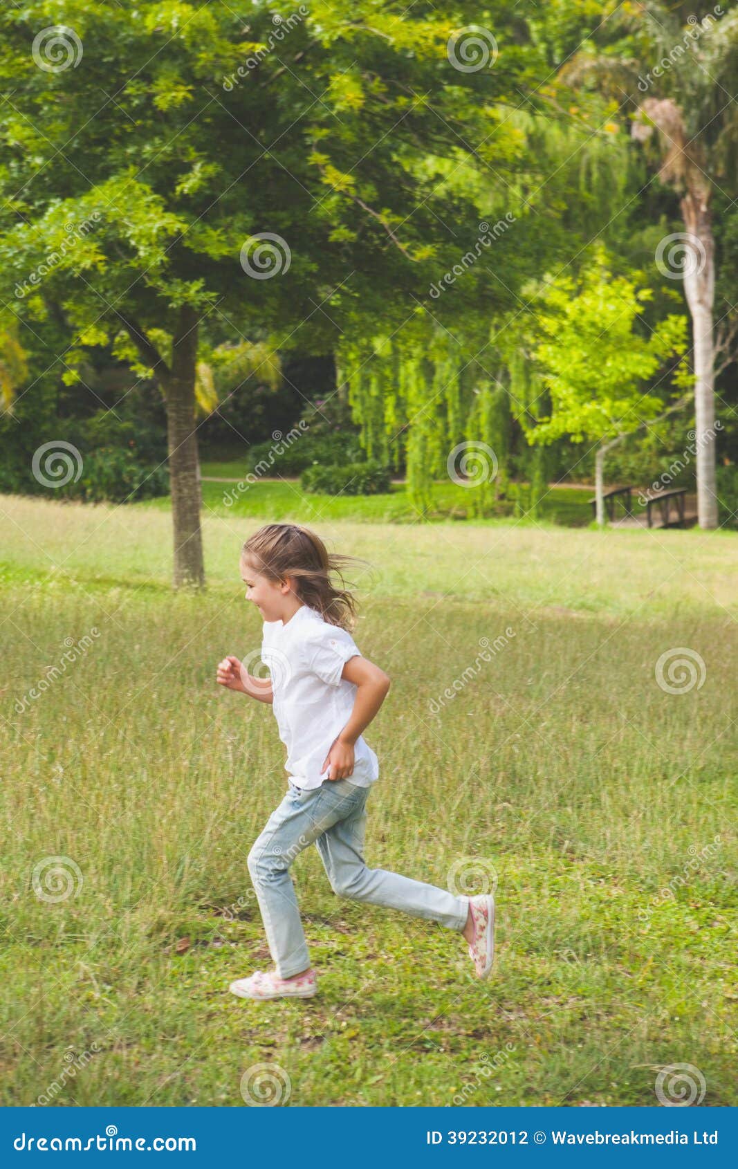 Side View of a Young Girl Running at Park Stock Photo - Image of grass ...