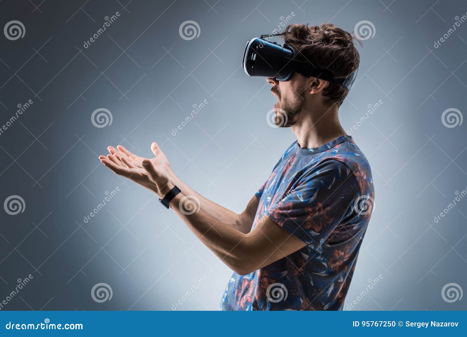 Side View of a Young Guy Using a VR Headset. Emotions Stock Photo ...
