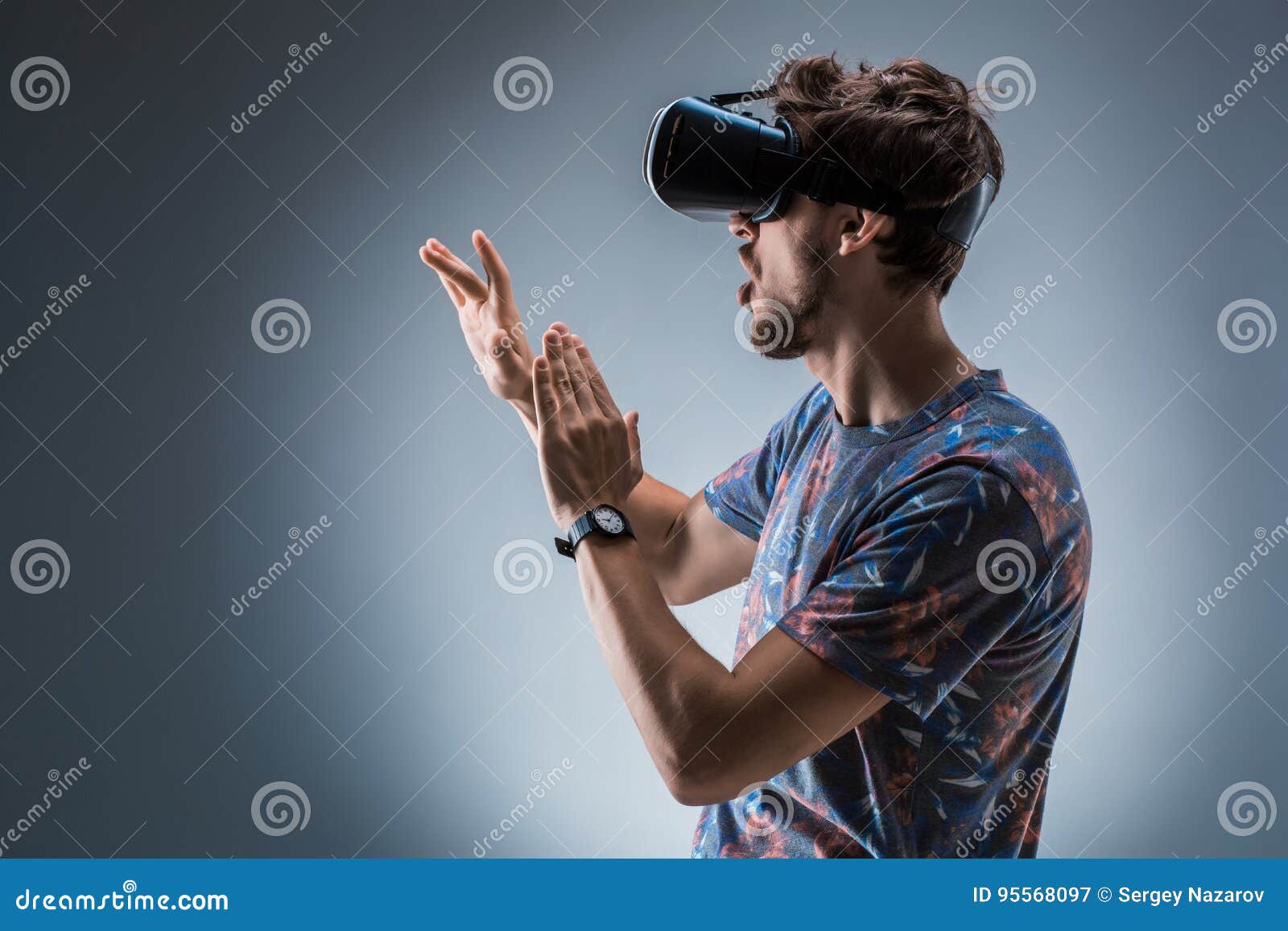 Side View of a Young Guy Using a VR Headset. Emotions Stock Image ...