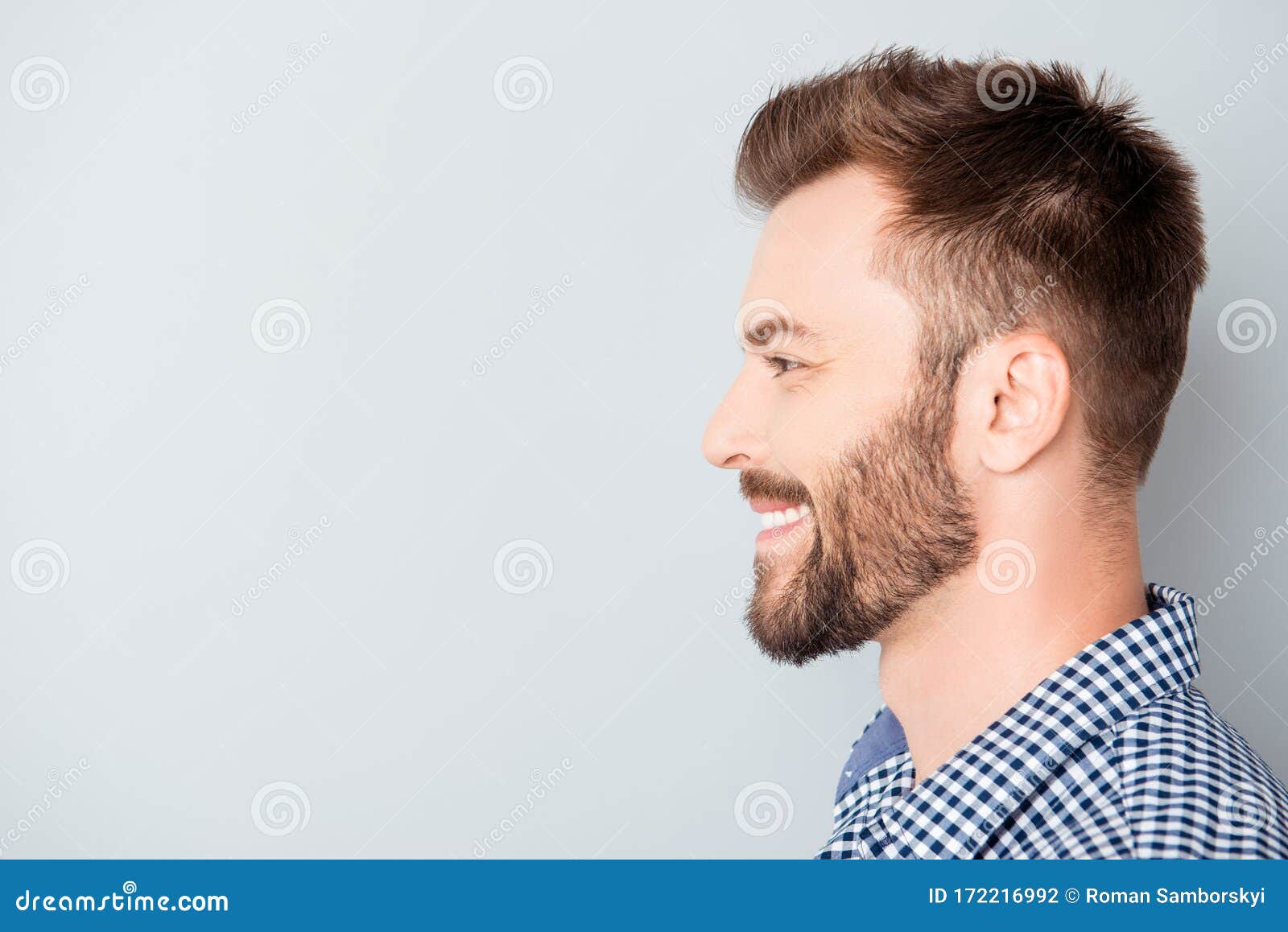 Side View of Young Happy Smiling Bearded Man Stock Photo - Image of ... Side View of Young Happy Smiling Bearded Man Stock Photo - Image of ...