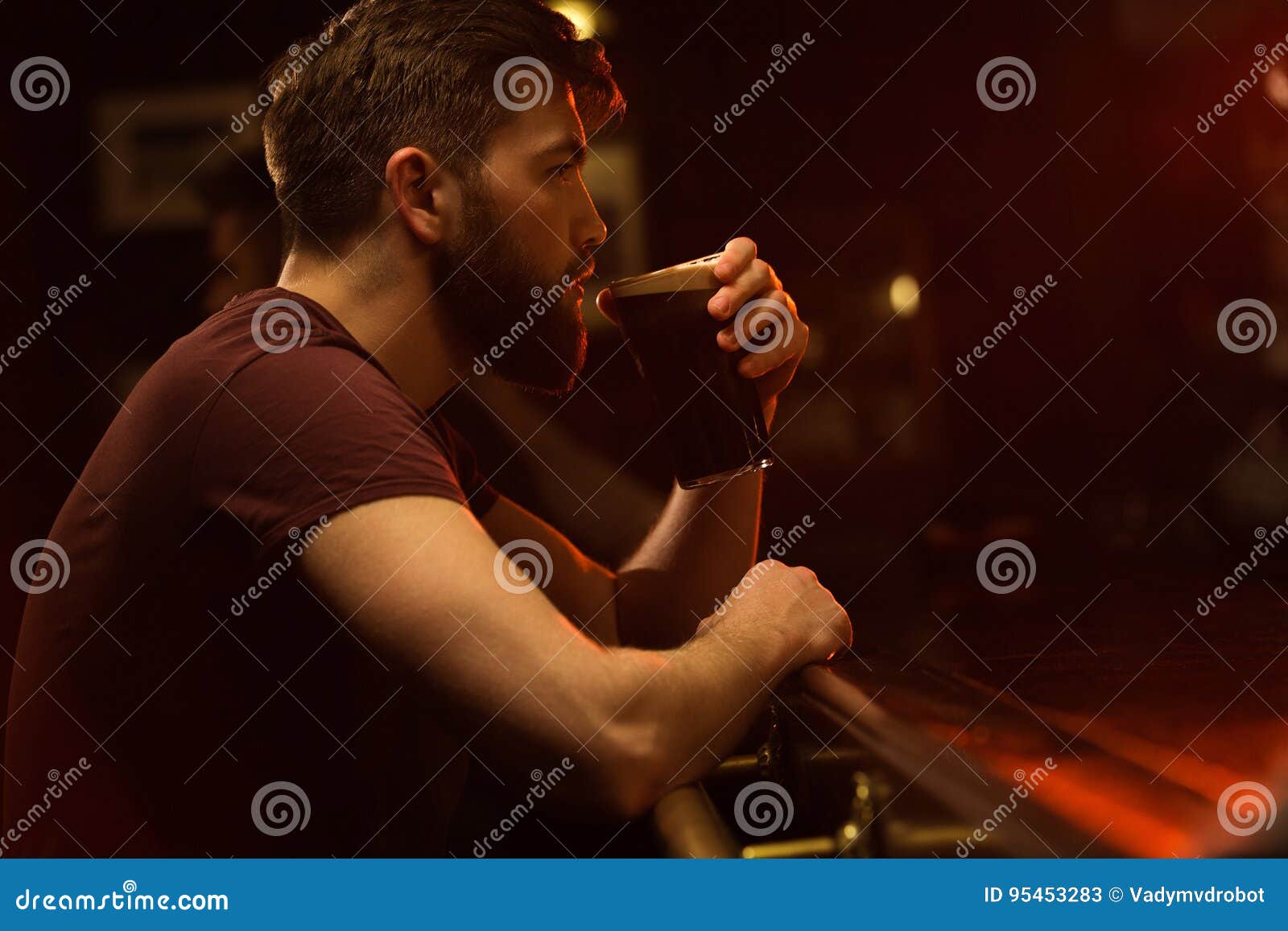 Side View of a Young Man Drinking Glass of Beer Stock Image - Image of ...