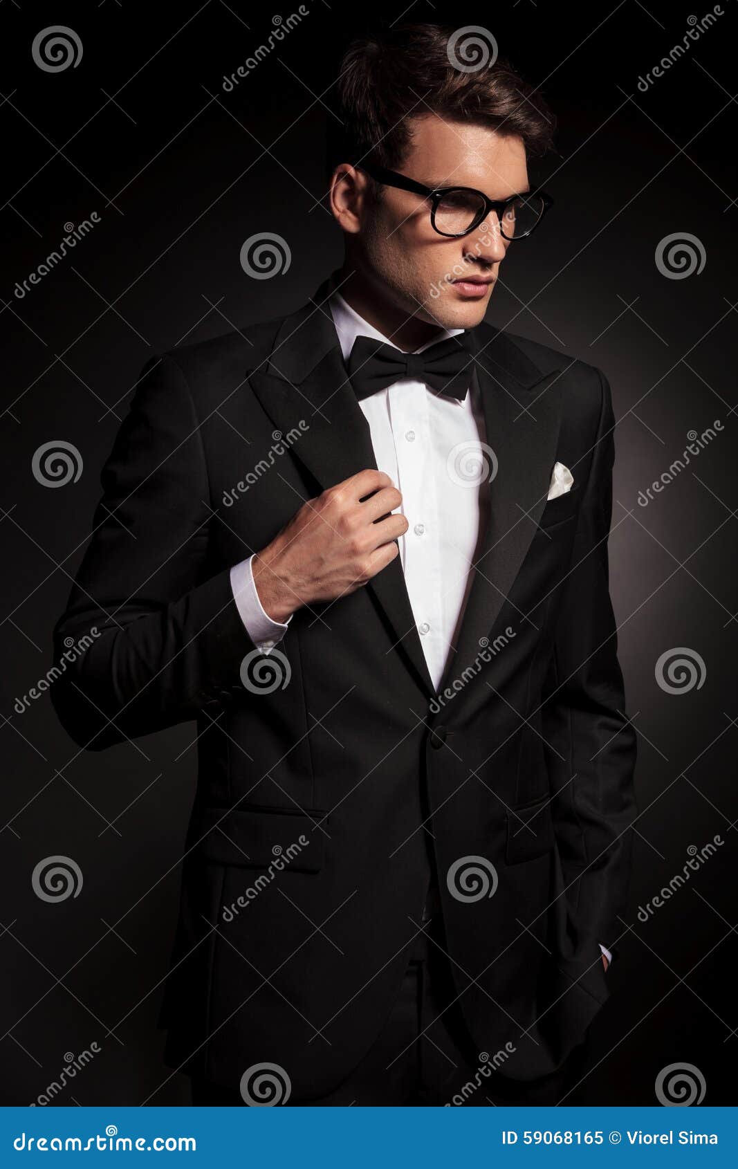 Side View of a Young Man Looking Down Stock Image - Image of successful ...