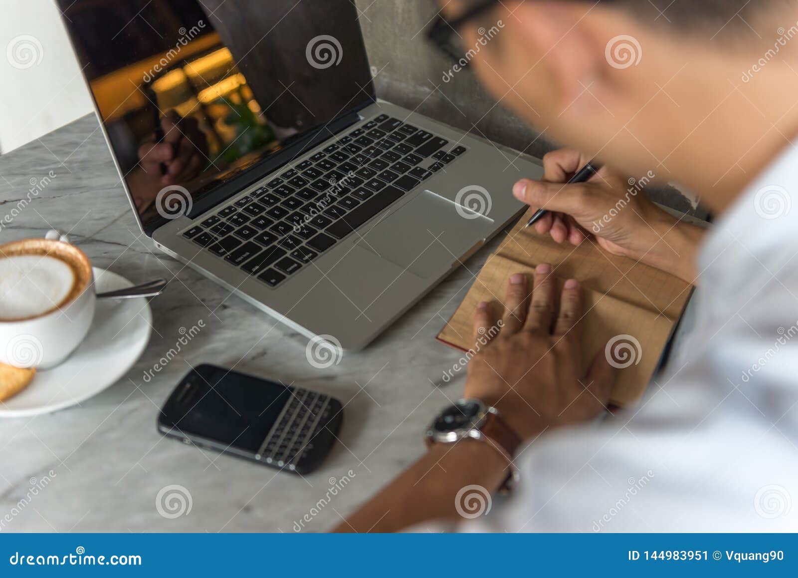 Side View of Young Man Writing Notes Stock Image - Image of ...